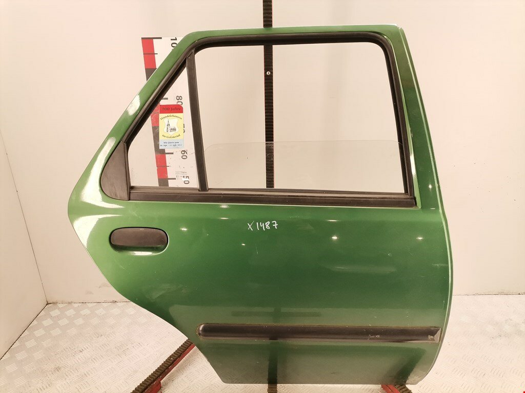 Дверь задняя правая Mazda 121 1E0872020 арт. 1040021