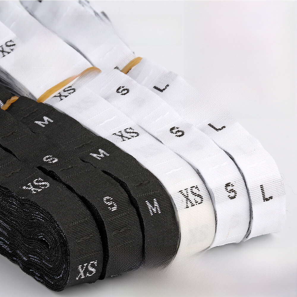 Этикетка размера одежды SM2XL, черная на белом фоне, XS