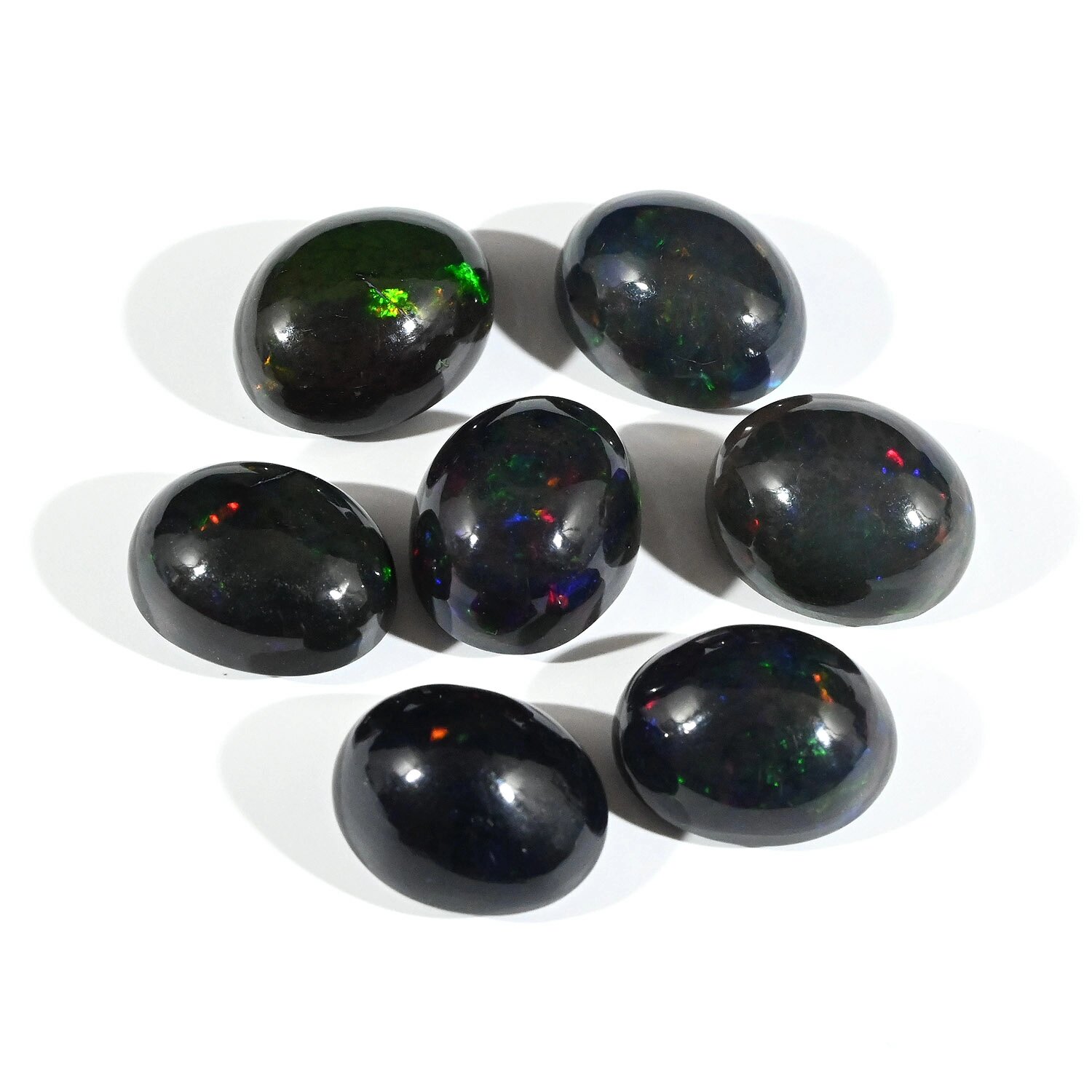 Кабошон из опала черного овал 10*12мм