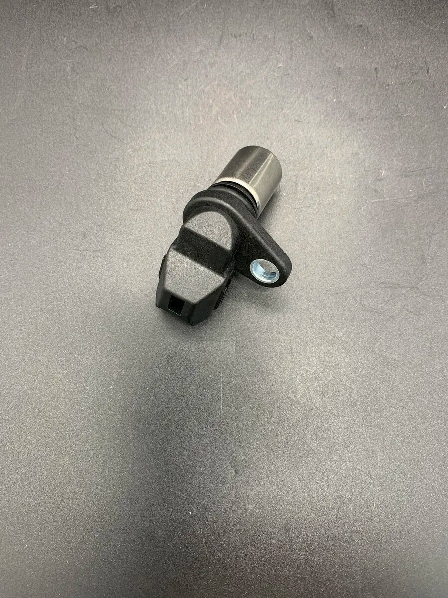 Датчик положения распредвала Новое