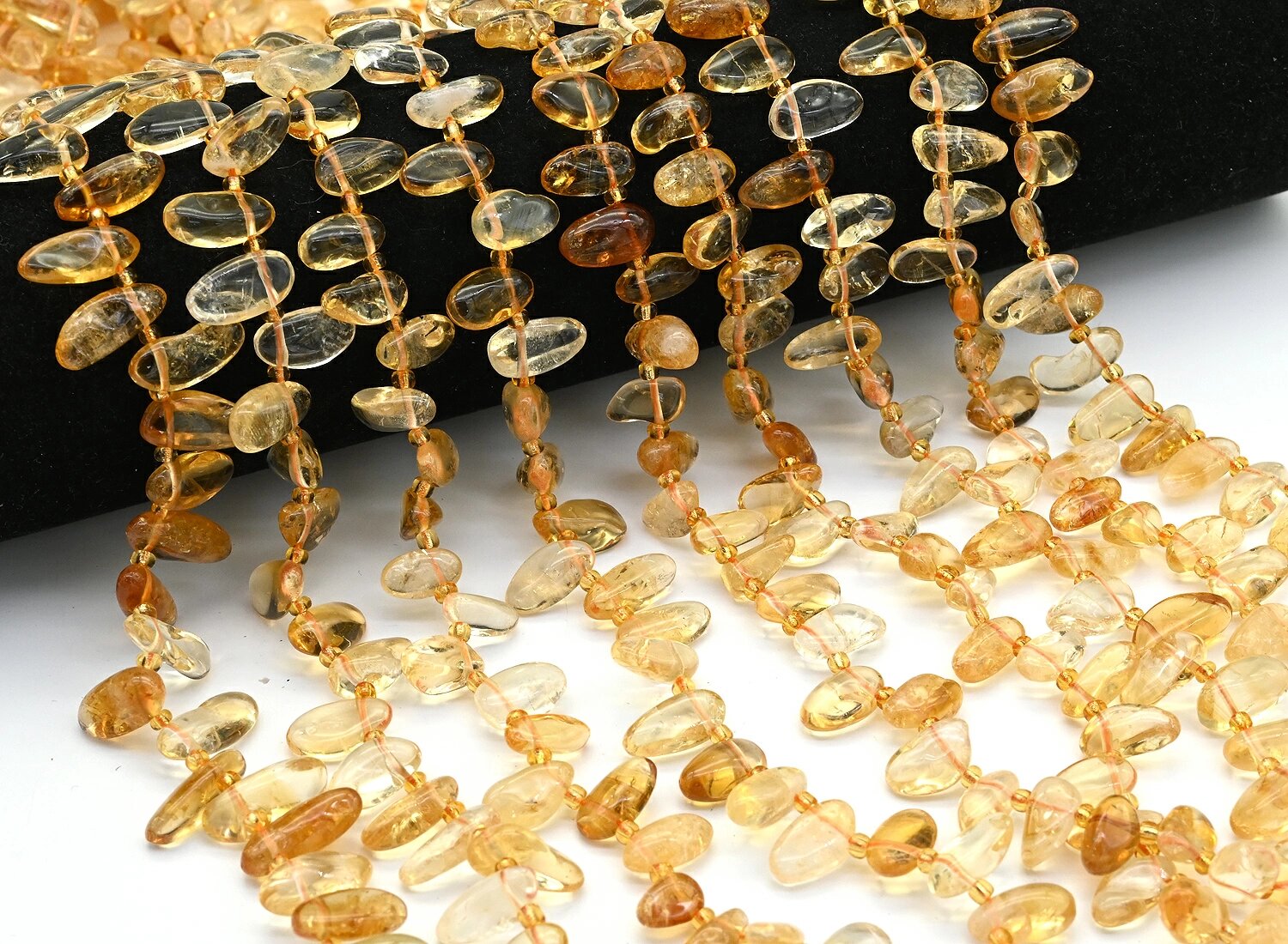 Бусины из цитрина галтовка 7*14мм, 40см, 50 бусин .