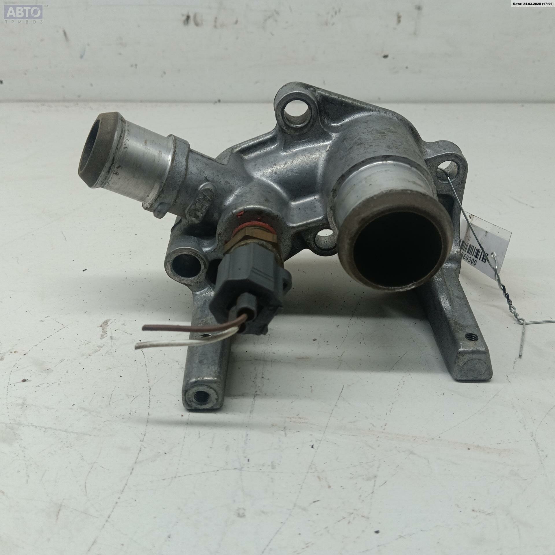 Фланец (тройник) системы охлаждения Ford Fusion