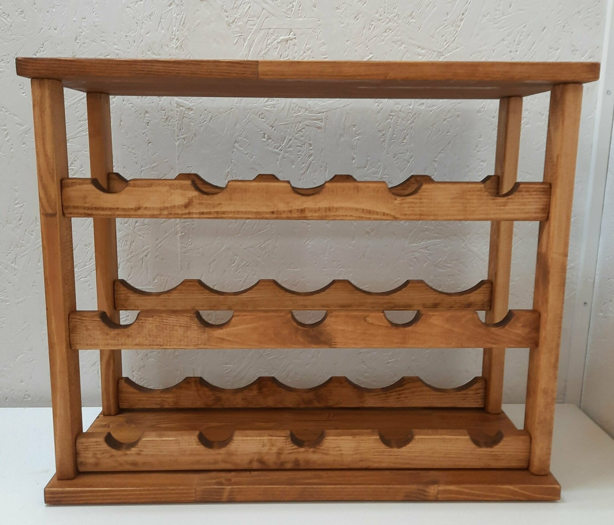 Стеллаж для 15 бутылок вина и шампанского деревянный со столешницей. Темный орех.