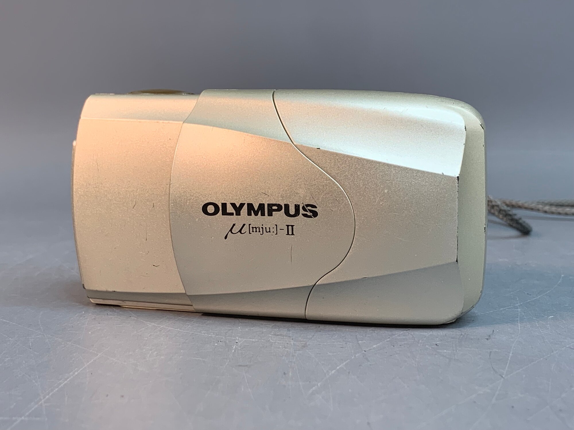 Olympus MJU II плохо закрывается крышка батарейного отсека