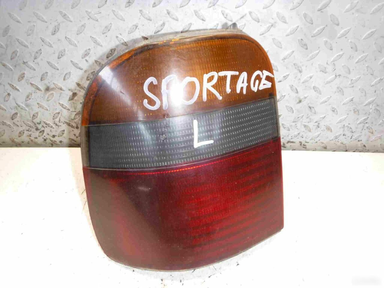 Фонарь задний левый Kia Sportage I (1993—2006) 0K01L51160