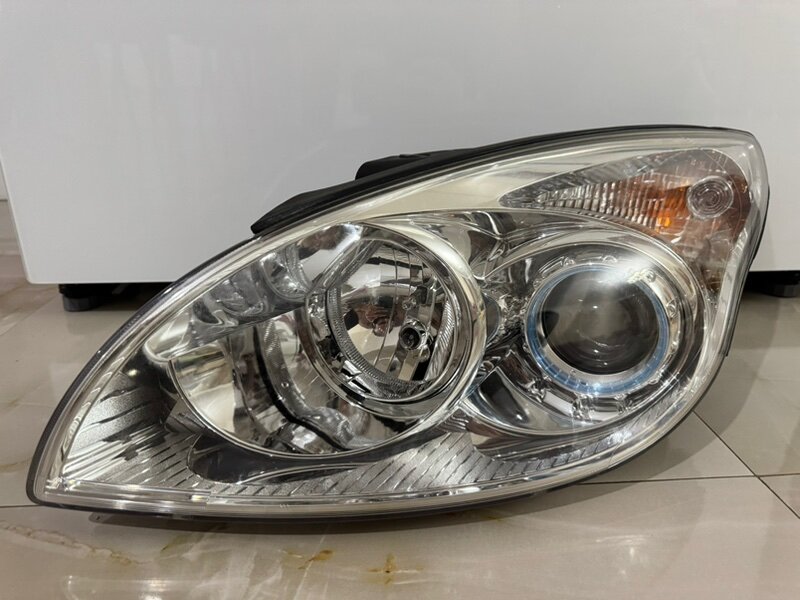 Фара галогеновая передняя левая Hyundai i30 921032L040