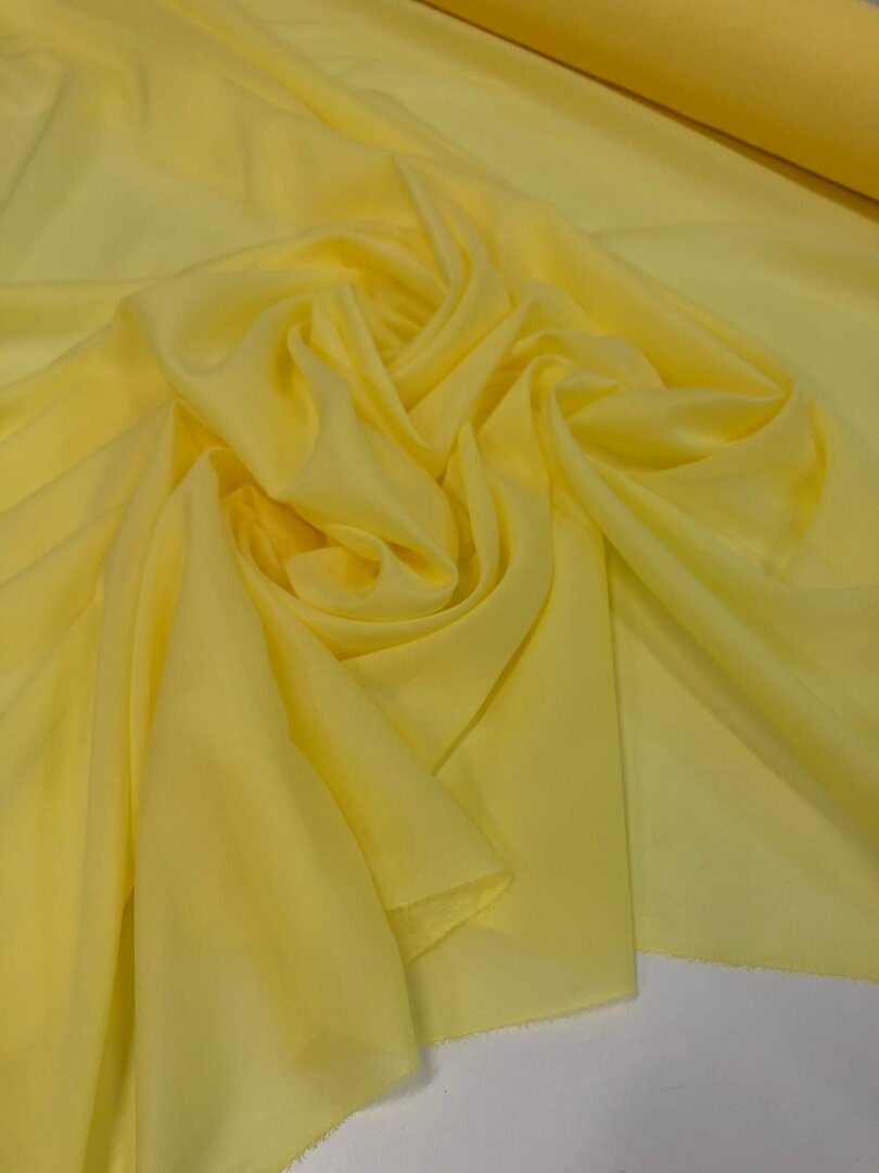 Ткань шифон мульти однотонный, цвет желто-лимонный, ширина 150 см, цена за 1.5 метра погонных.