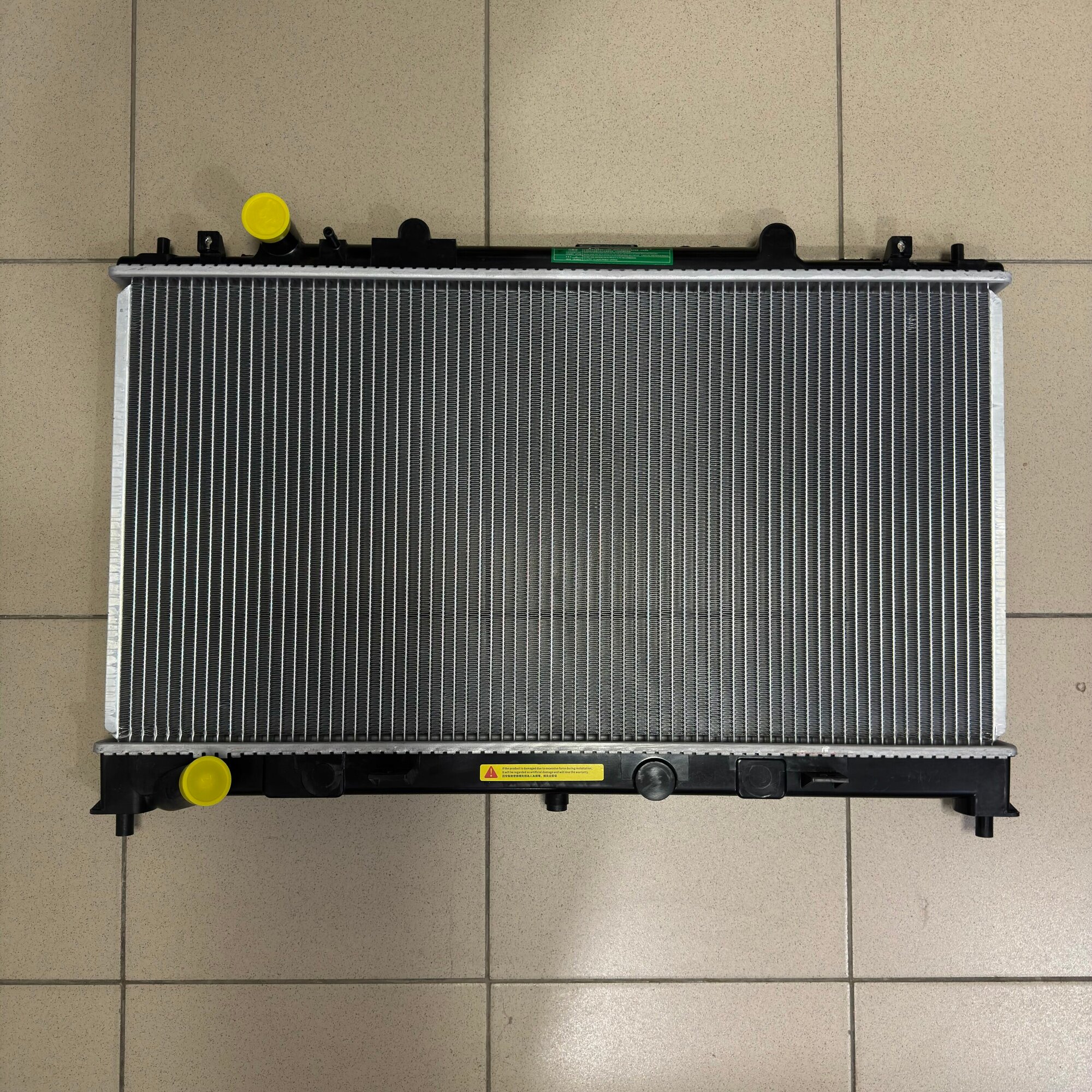 Радиатор охлаждения Faw Besturn B50 [1.6 8V 5MT седан] FA0115200P1