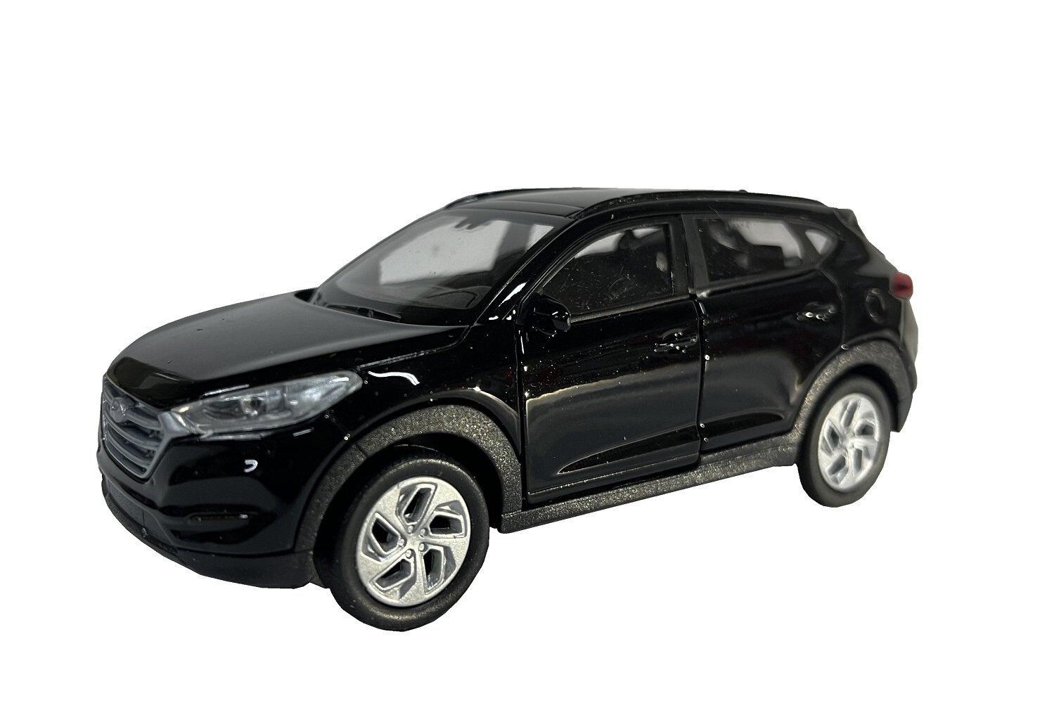 Модель автомобиля Welly 1:38 Hyundai Tucson черный 43718 металл