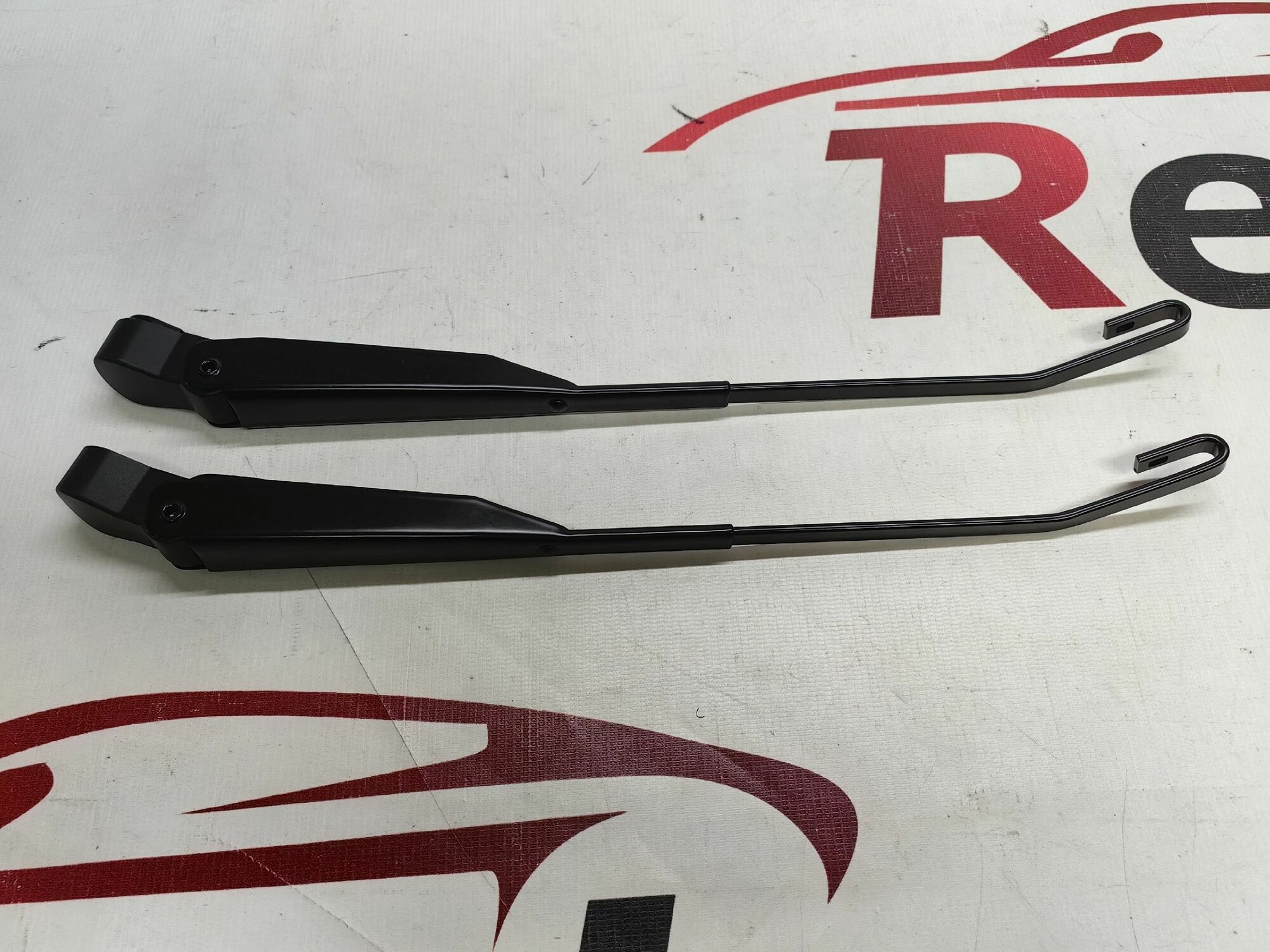 Поводки стеклоочистителя (рычаги дворника) 21214 нового образца комплект 2 штуки