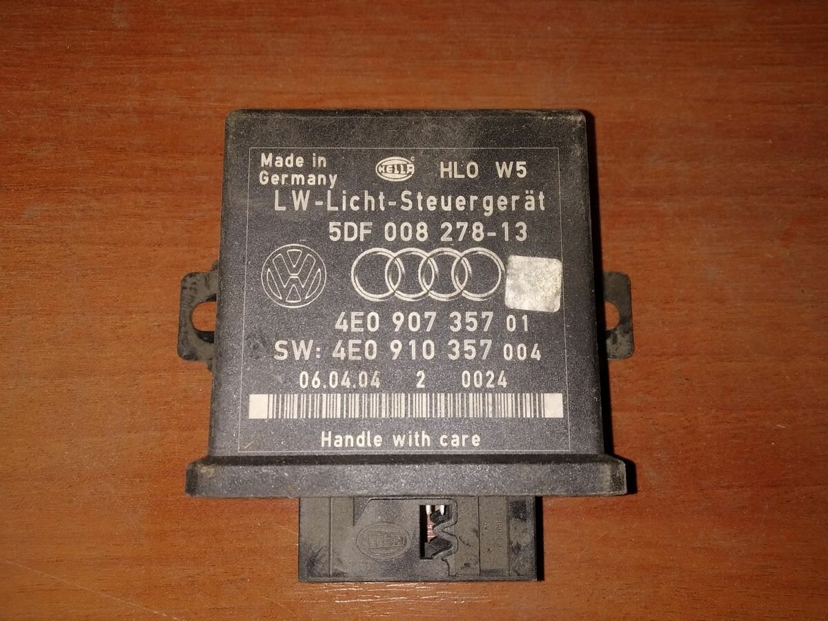 Блок управления светом корректором Audi A6 A8 4E0910357