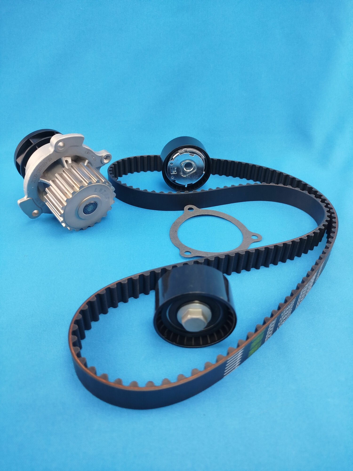 РК ГРМ "TRIALLI" для автомобилей Веста, X-Ray 1.8л (2 ролика+ремень+помпа)