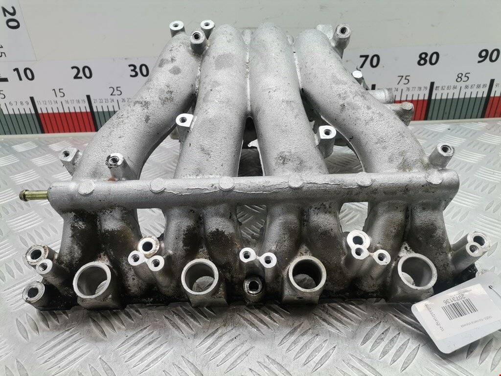 Коллектор впускной Mitsubishi Carisma MD354561 арт. 2073136