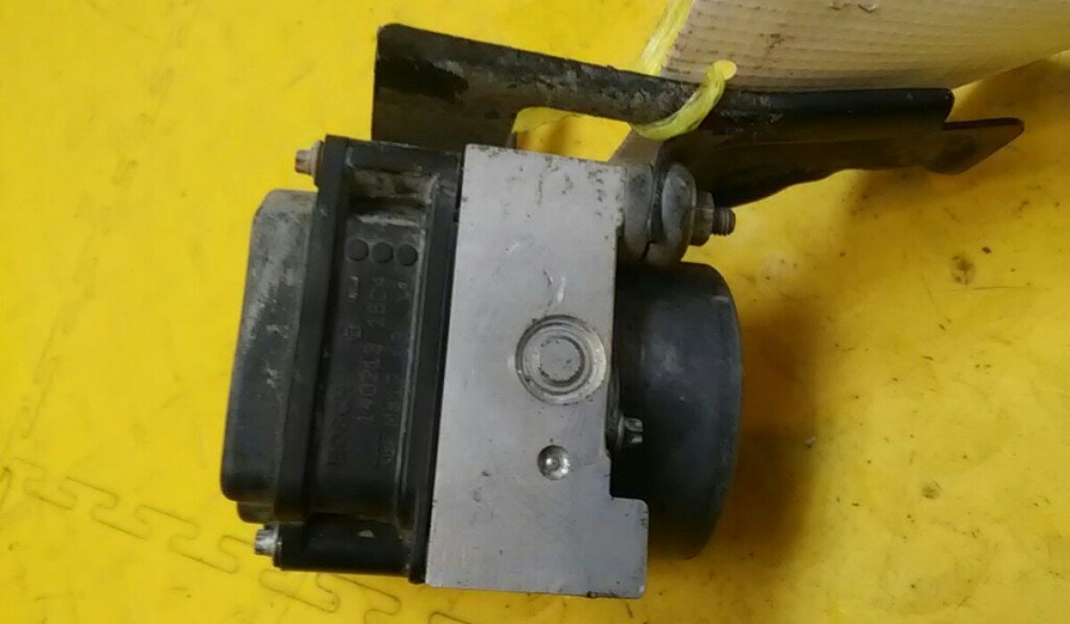 Блок ABS (насос) Note (E11) Nissan 476609U100