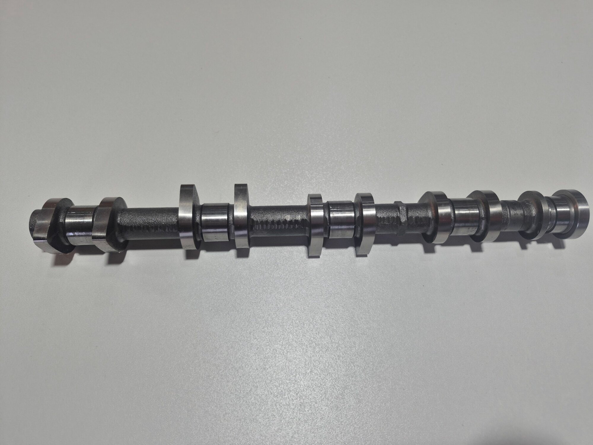 Распредвал выпускной JAC J7 [1.5 16V 6MT лифтбэк Turbo] 1006030GH500