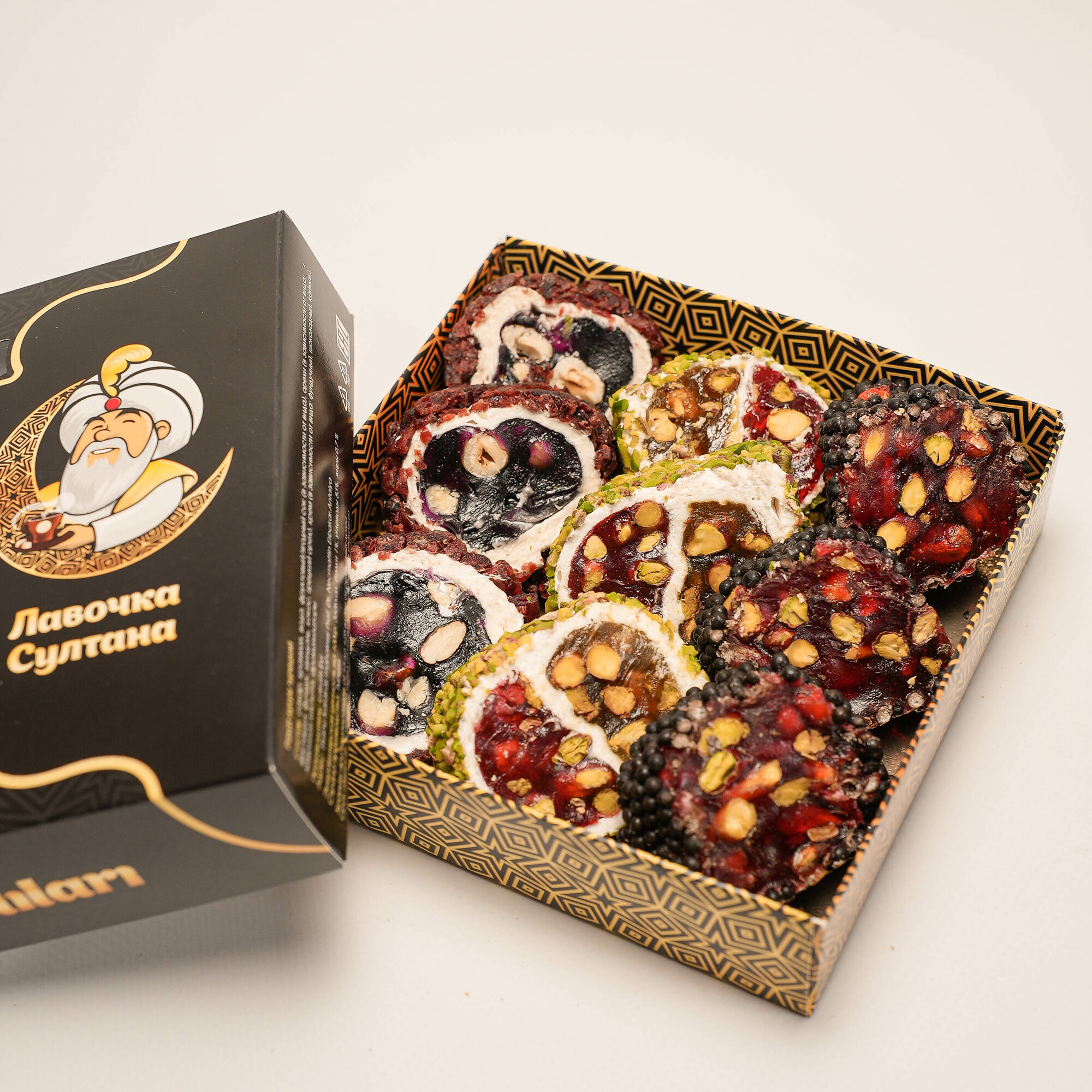 Лукум гранатовый и цитрусовый с фисташками, виноградом, шоколадным воздушным рисом 500 гр. Турция