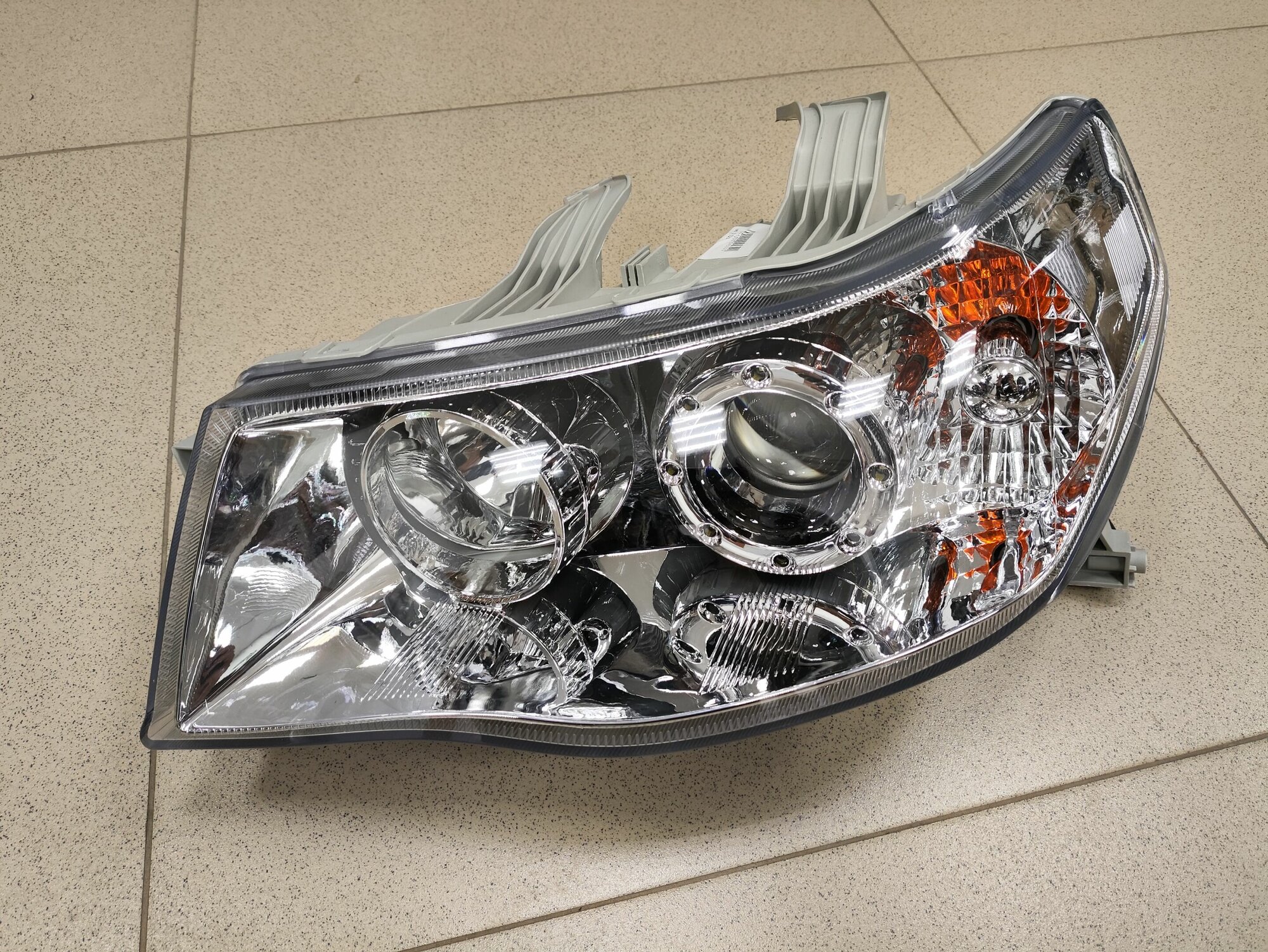 Фара левая (с диодами) Faw Vita [1.5 16V 5MT седан]