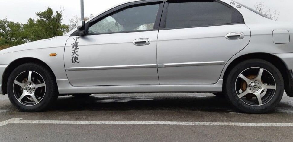Пластиковые накладки на пороги Kia Spectra (2000 - 2011)