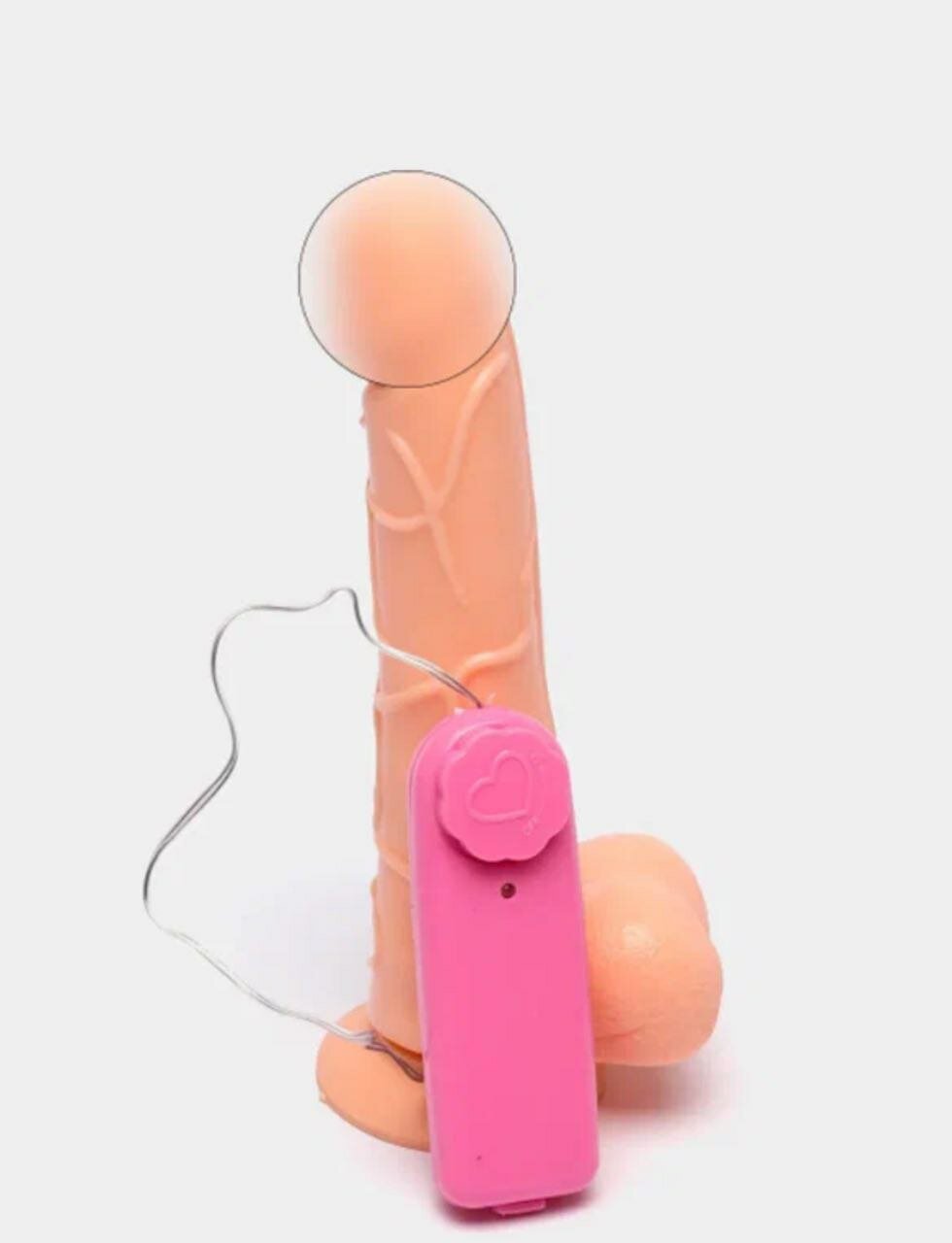 Вибратор- фаллоимитатор телесный реалистичный, на присоске, с вибрацией на пульте управления.