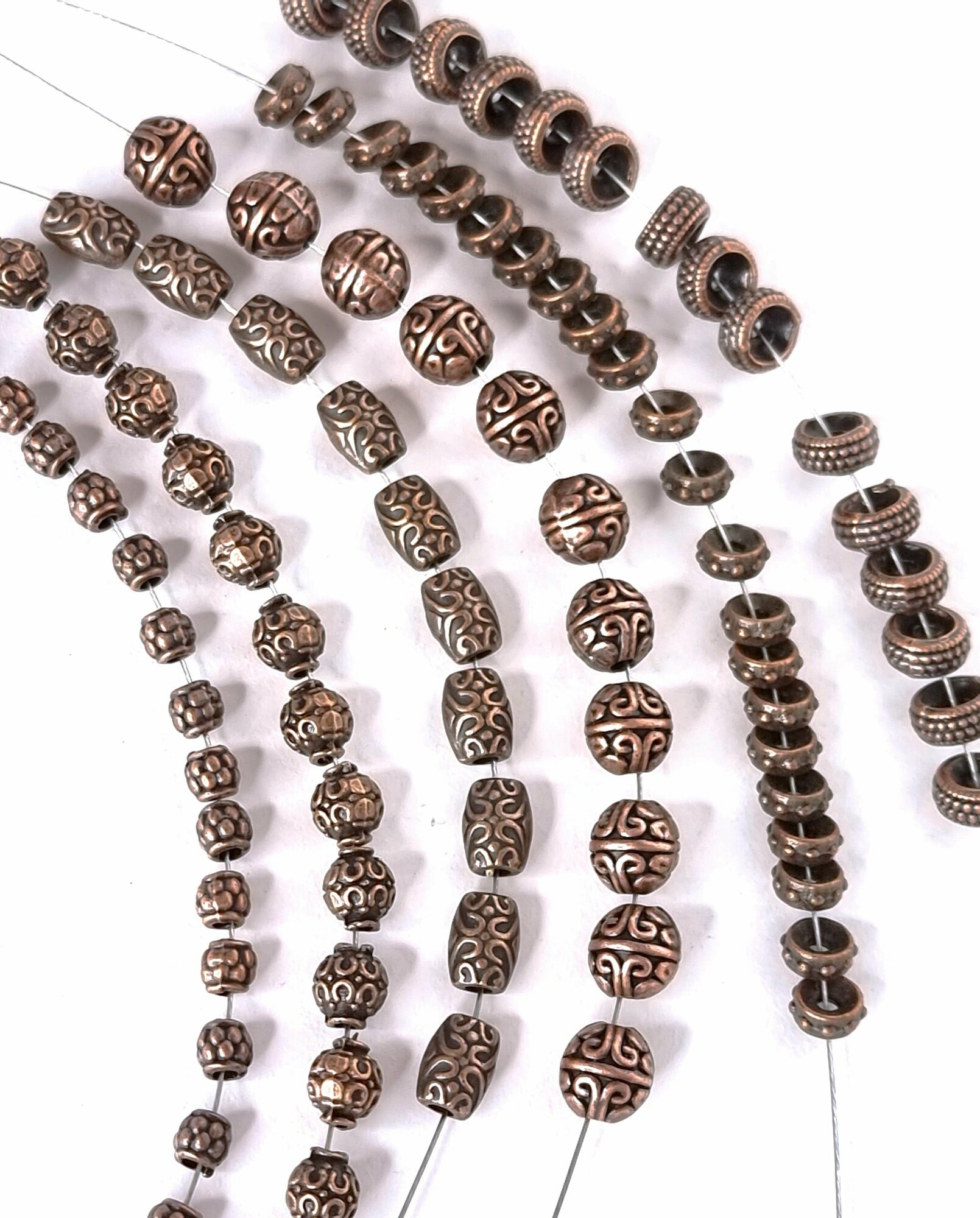 Металлические бусины и диски 4-8мм. 130шт. Цвет Медь.