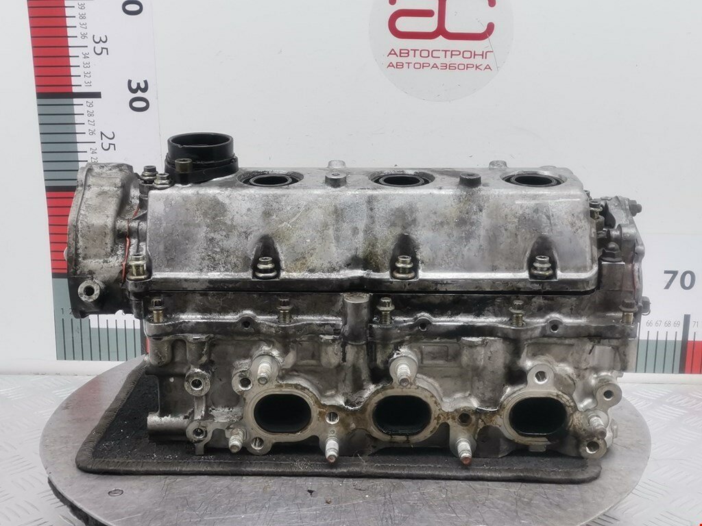 Головка блока цилиндров (ГБЦ) Saab 9-5 (1) арт. 2036804