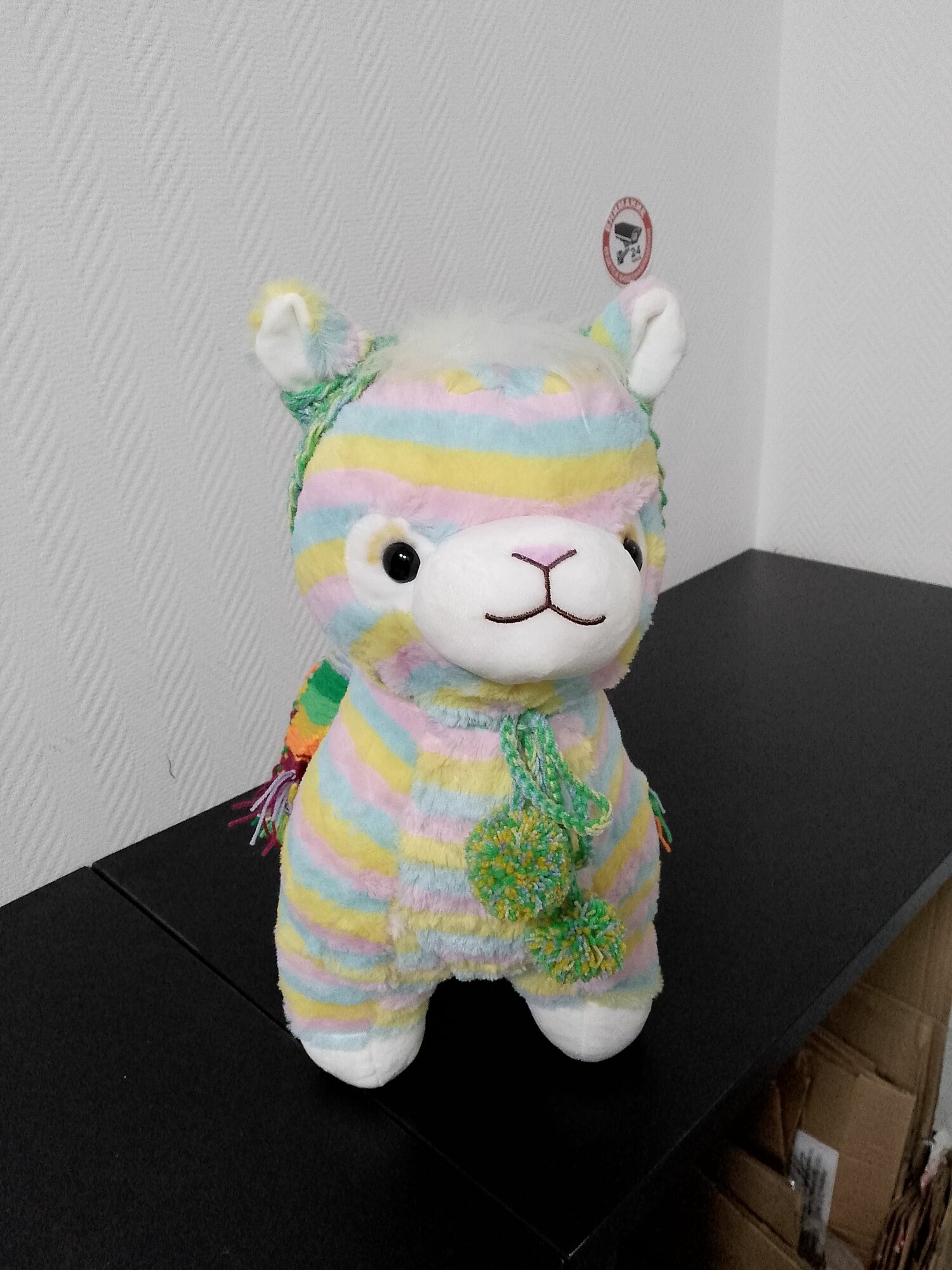 Мягкая игрушка лама в шапочке с попоной