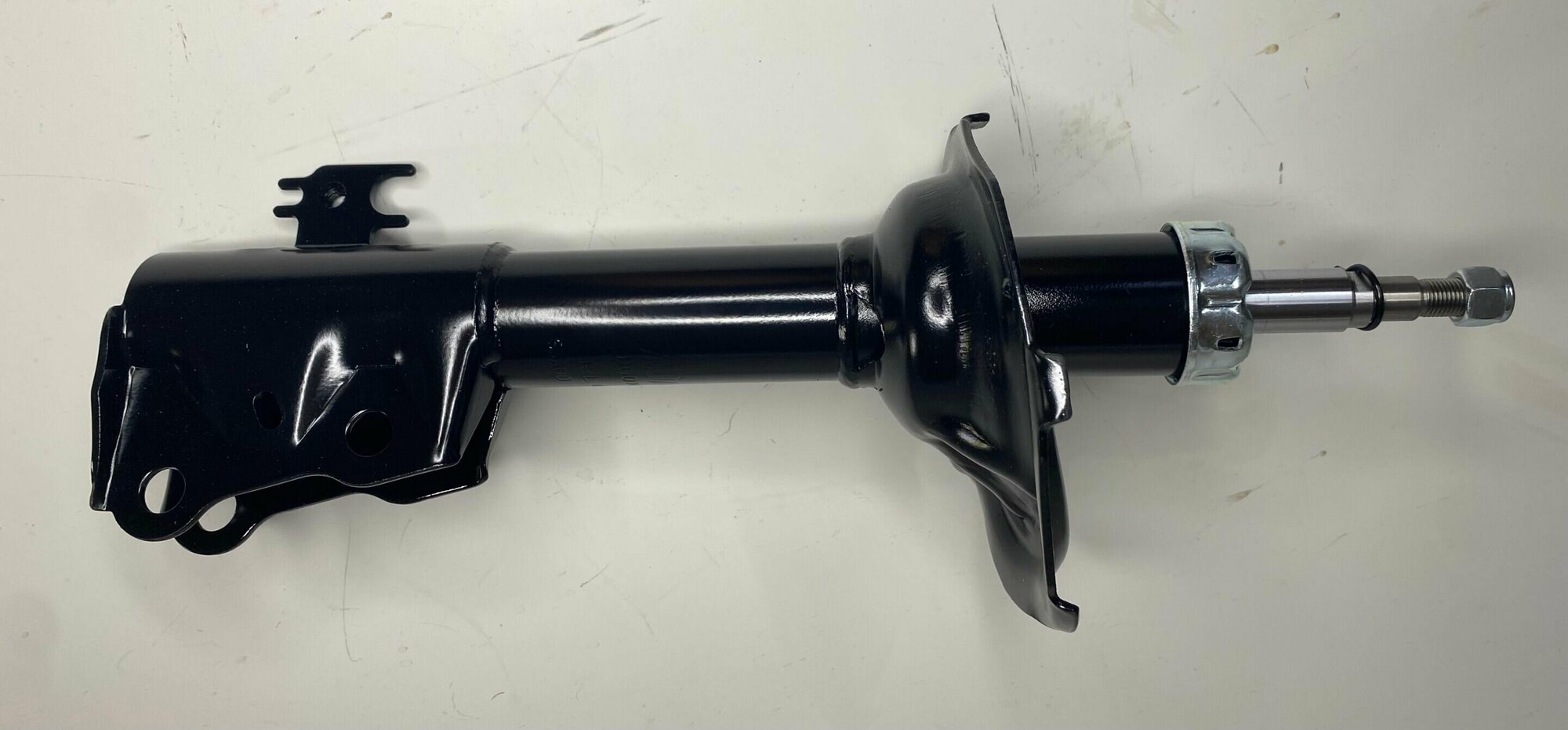 Амортизатор передний MILES Geely MK Cross [1.5 16V 5MT хетчбэк]