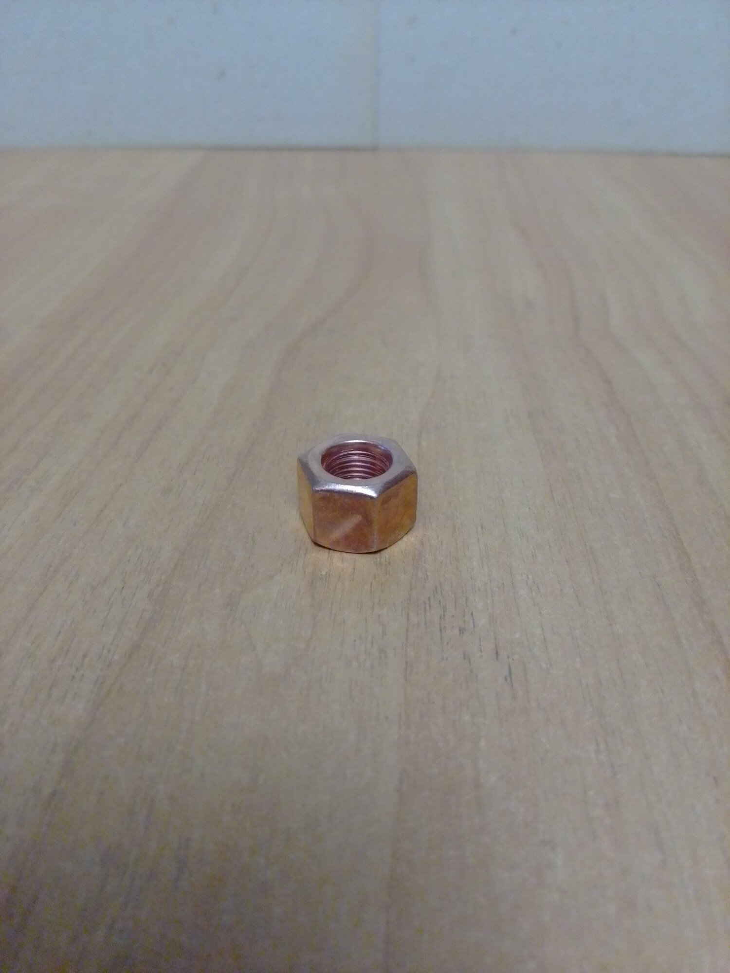 250688-п5 . Гайка коллектора, приёмной трубы М10х1 омедненная. Россия, Красная Этна. Ключ 17 мм.