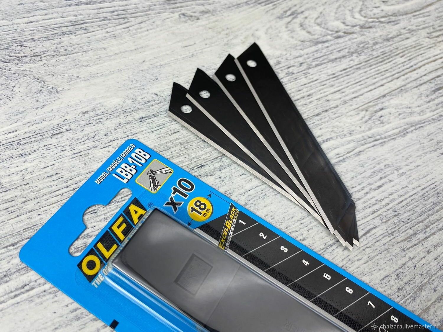 Лезвие OLFA EXCEL BLACK сегментированное, 18 мм, 10шт, в боксе OL-LBB-10В