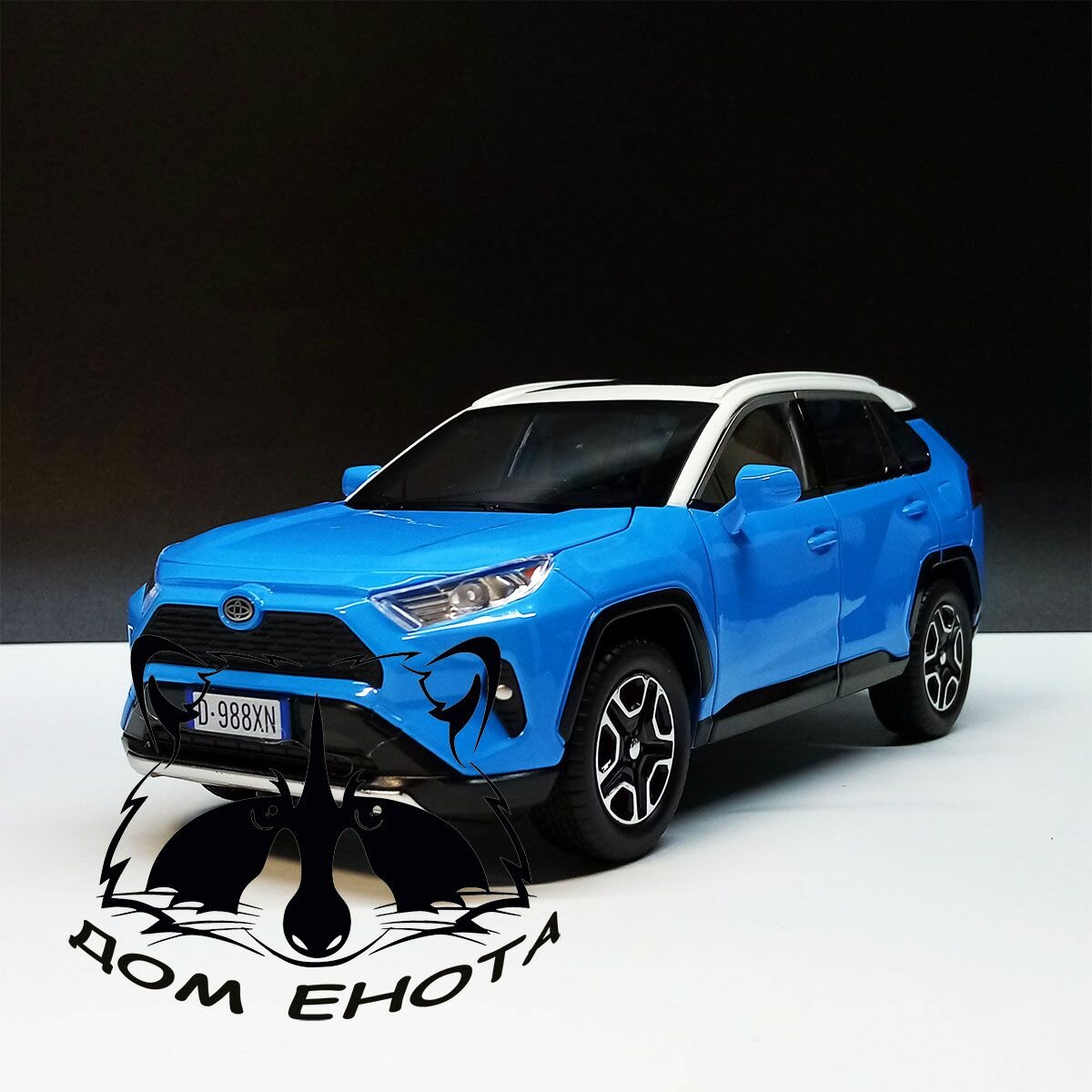Машинка Toyota RAV4. Металлическая модель автомобиля Тойота Рав4 голубой 20см. Инерционная игрушка машина 1:24