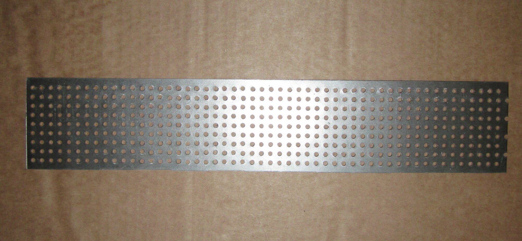 Сетка зернодробилки эликор боковая (315х60мм)