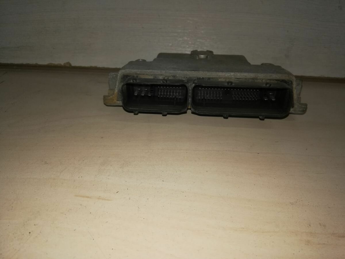 Блок управления двигателя Skoda Fabia 1.2 CGP 03E906019AE