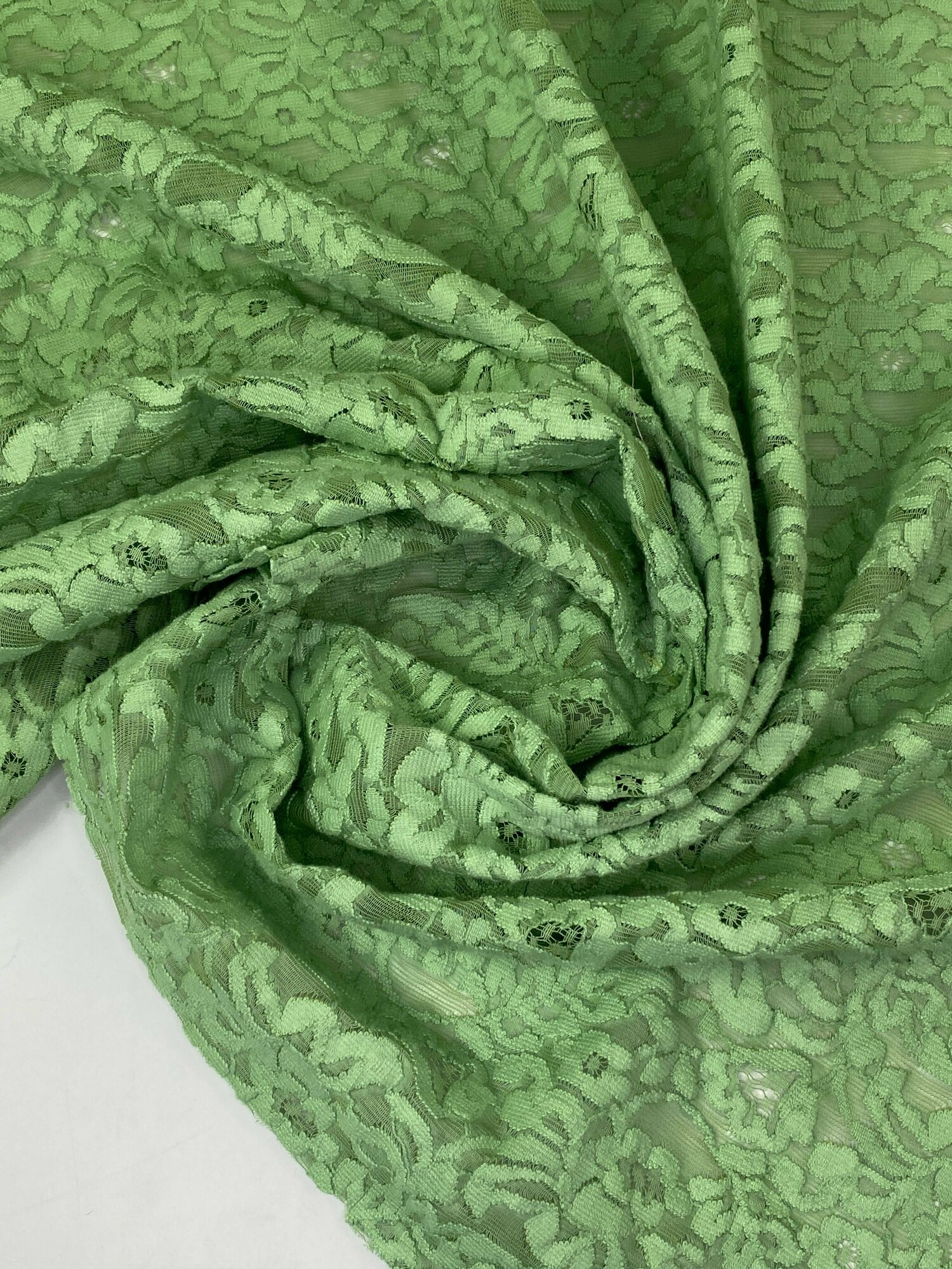 Ткань кружево зеленого цвета