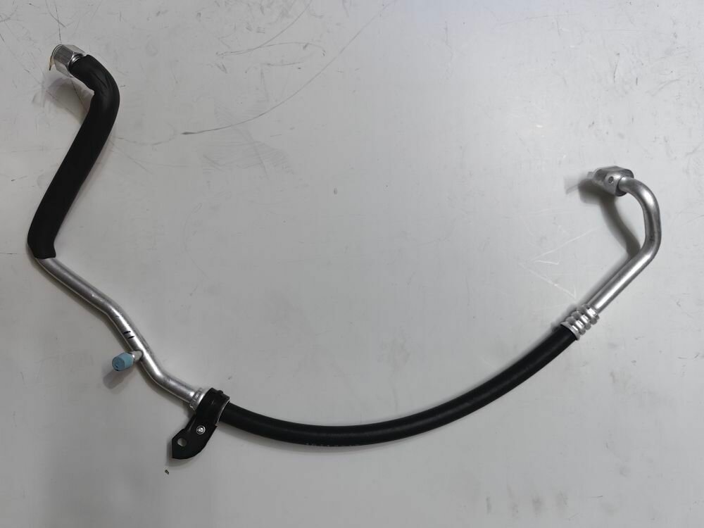 Трубка кондиционера низкого давления Geely Emgrand EC7 [1.5 16V 5MT седан] 1067002692