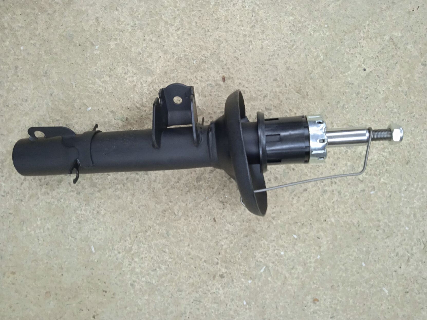 Амортизатор передний левый Brilliance H530 [1.6 16V 5AT седан] 4037009