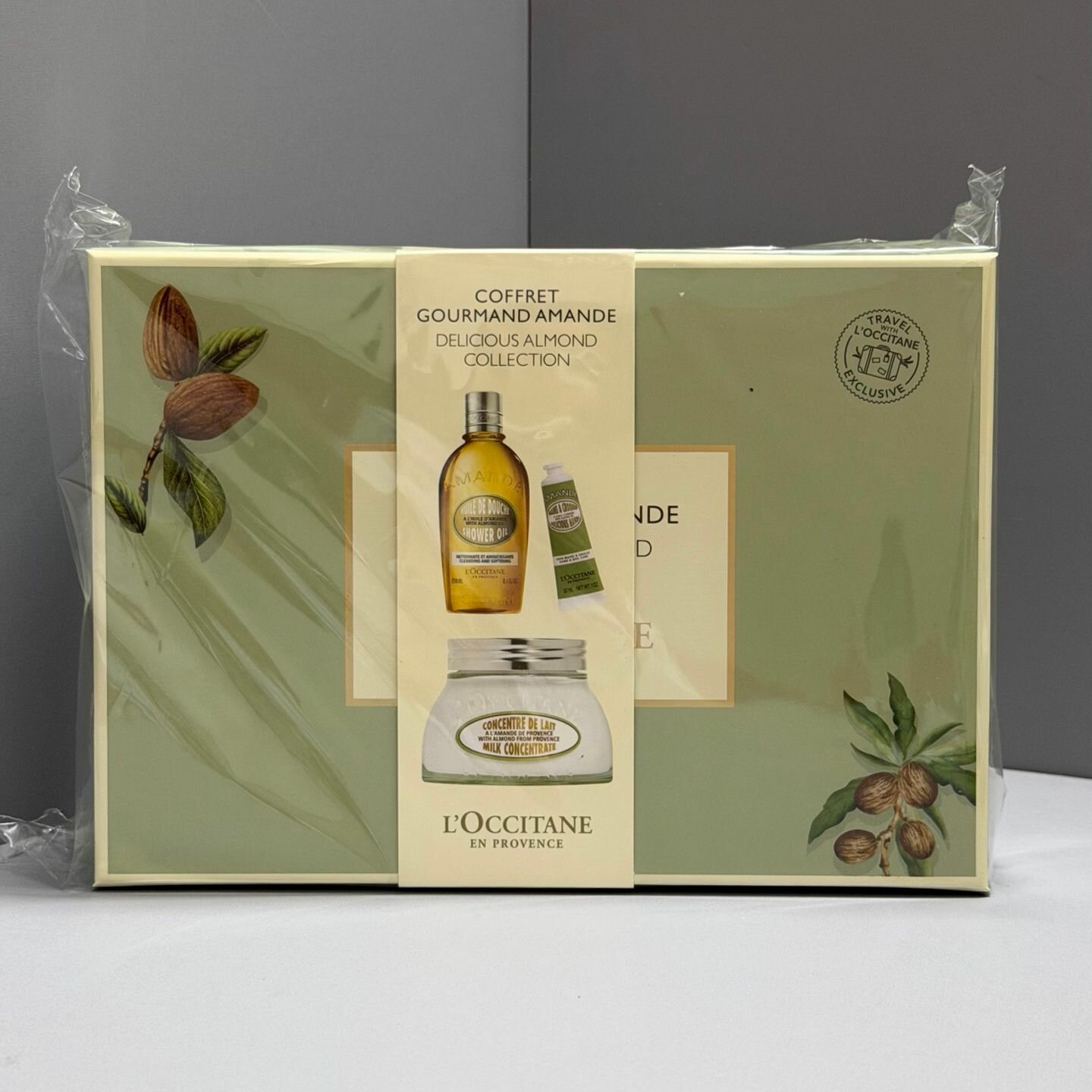 L'Occitane Набор "Миндаль и сладкий абрикос" (3 предмета): масло для душа 250 мл + крем для тела 200 мл + крем для рук 30 мл