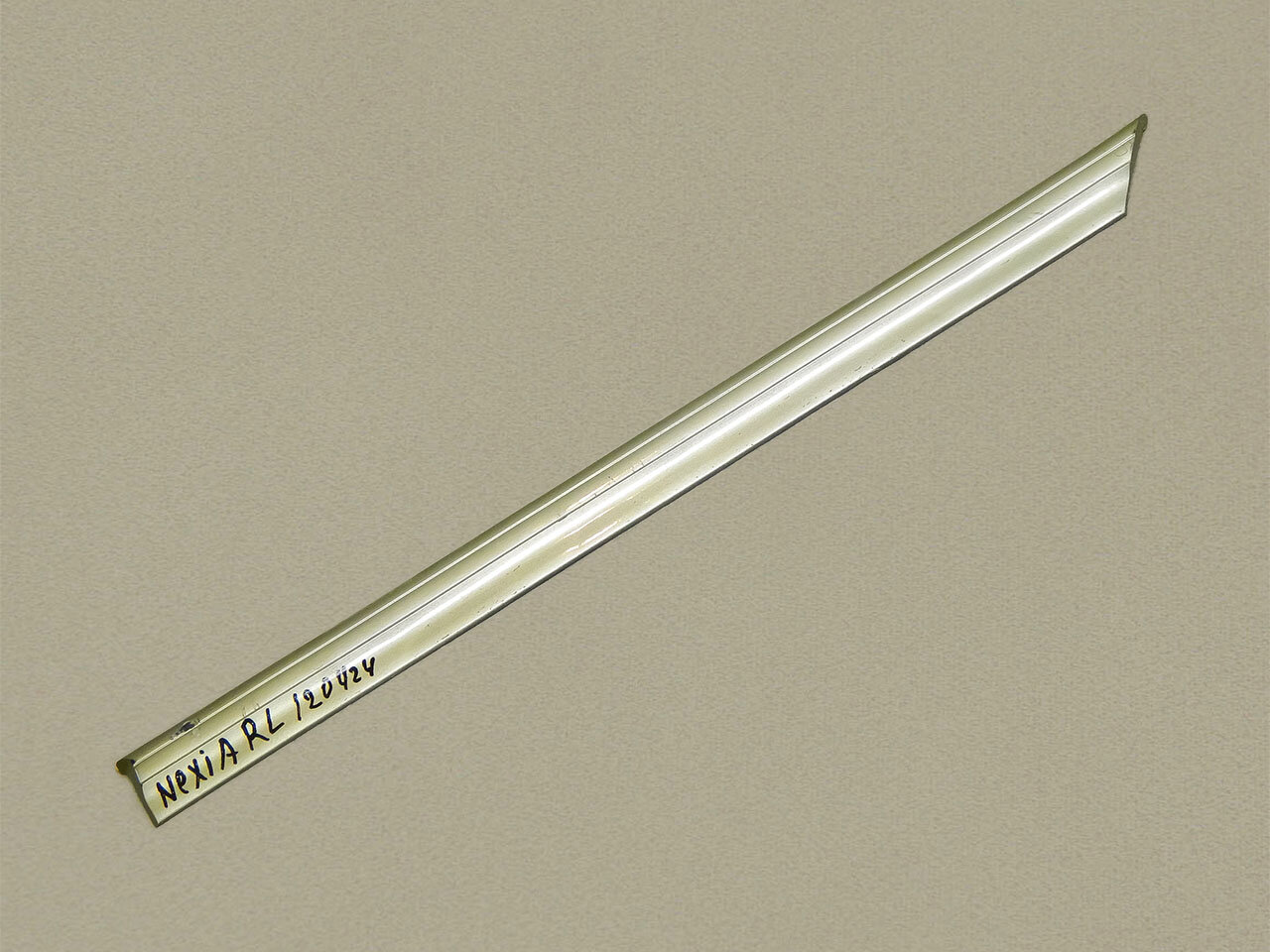 Молдинг двери зад. левой Daewoo Nexia (недочет)