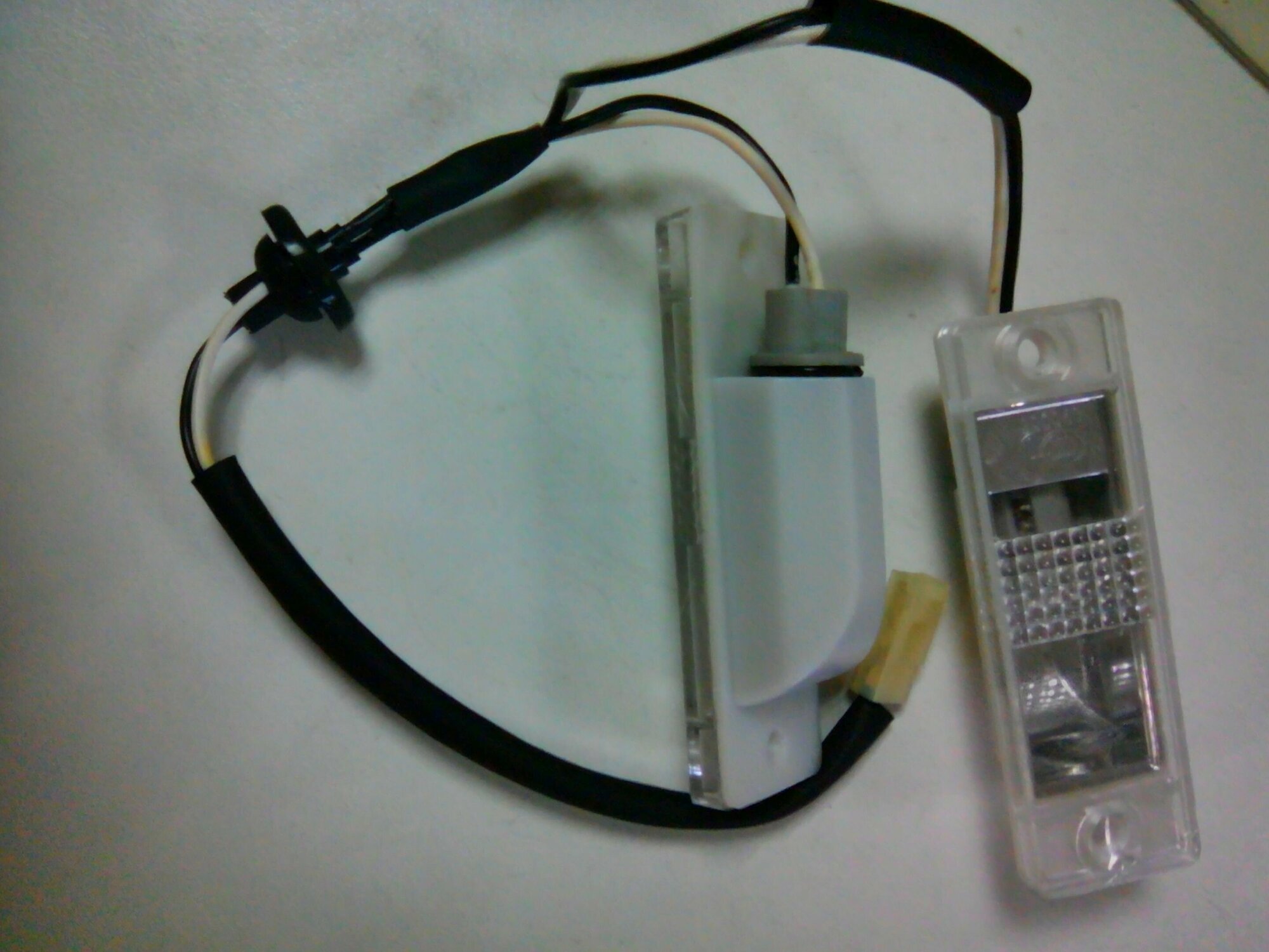 Фонарь номерного знака Lifan Smily (320) [1.3 16V 5MT хетчбэк] F4108100