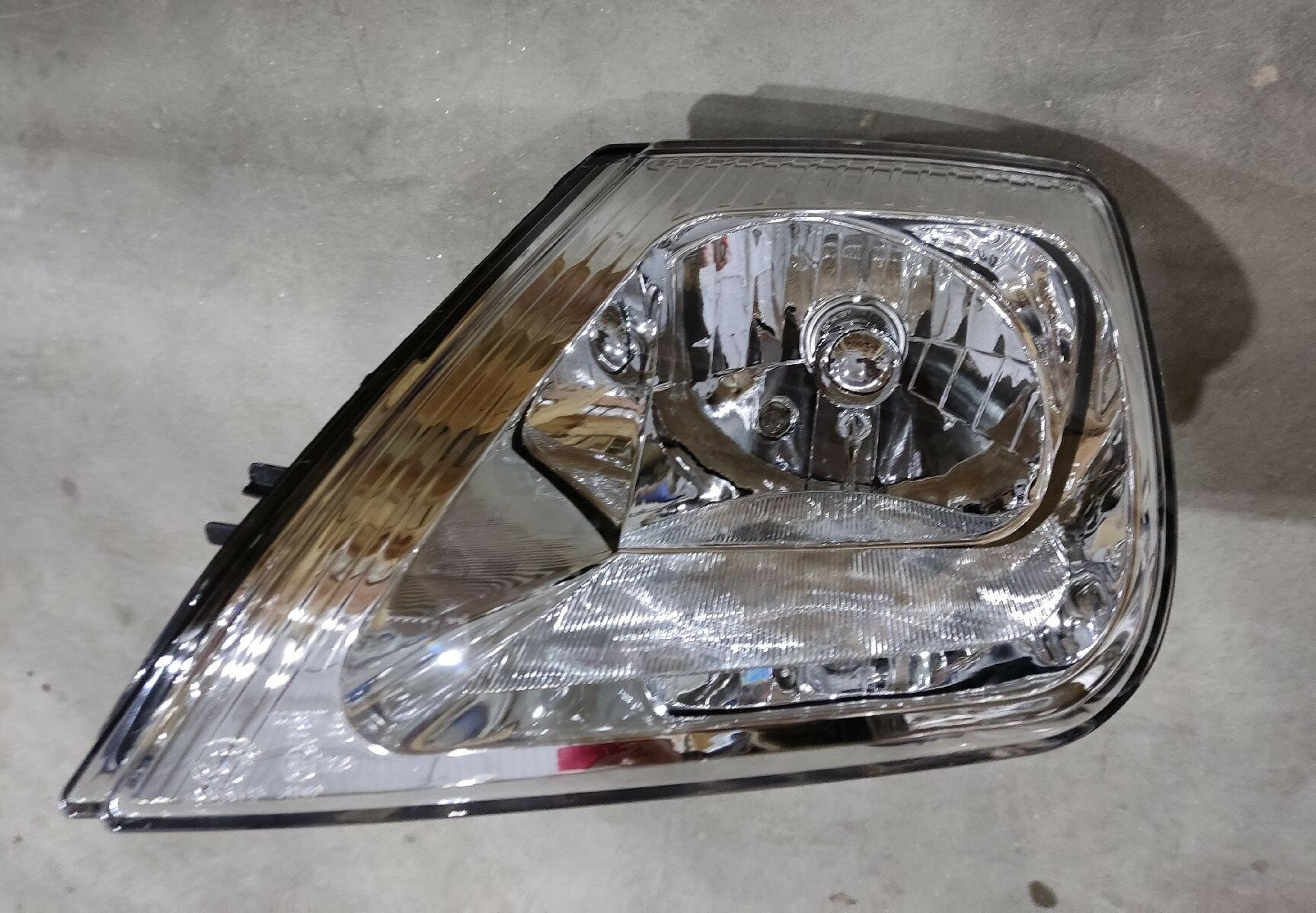 Фара левая Hafei Brio [1.1 16V 5MT хетчбэк] AB37110010