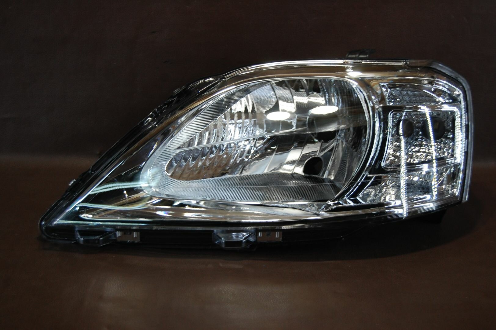 Фара левая (галоген) для Renault Logan (2009-15гг) CTR0108702