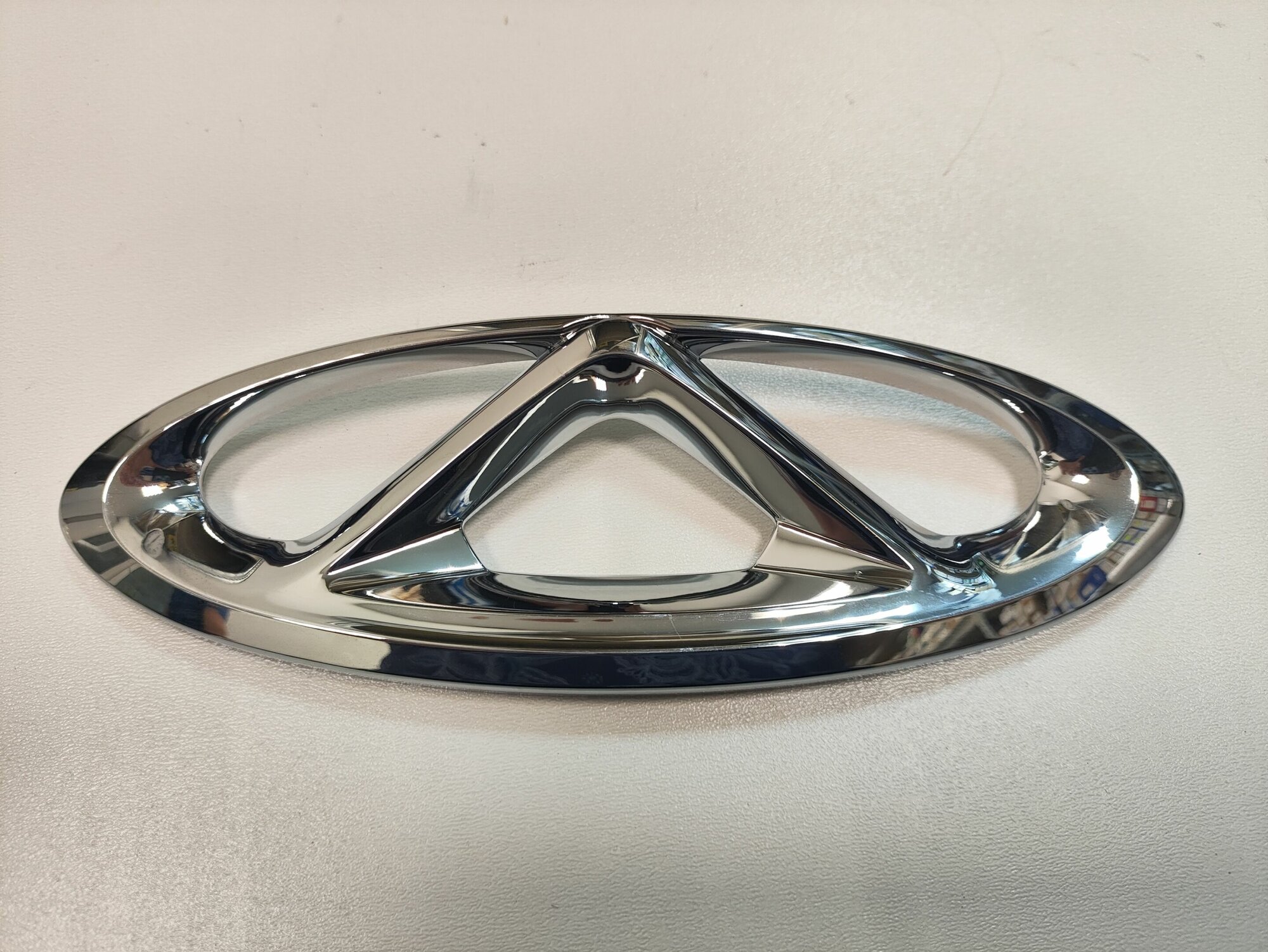 Эмблема решетки радиатора Chery Tiggo 5 (2014-2016) [2.0 16V 5MT внедорожник] T213921506