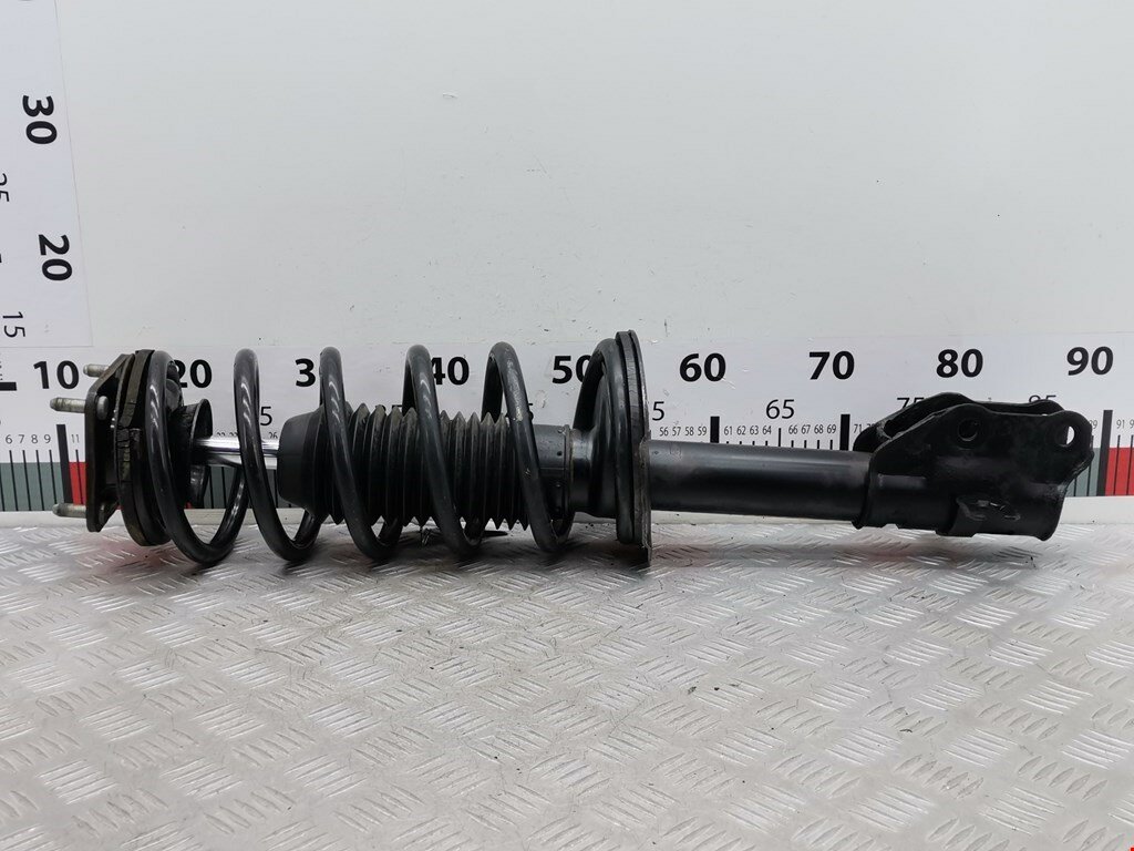 Стойка амортизатора переднего левого Mazda CX-7 (ER) EH1434900 арт. 2032259