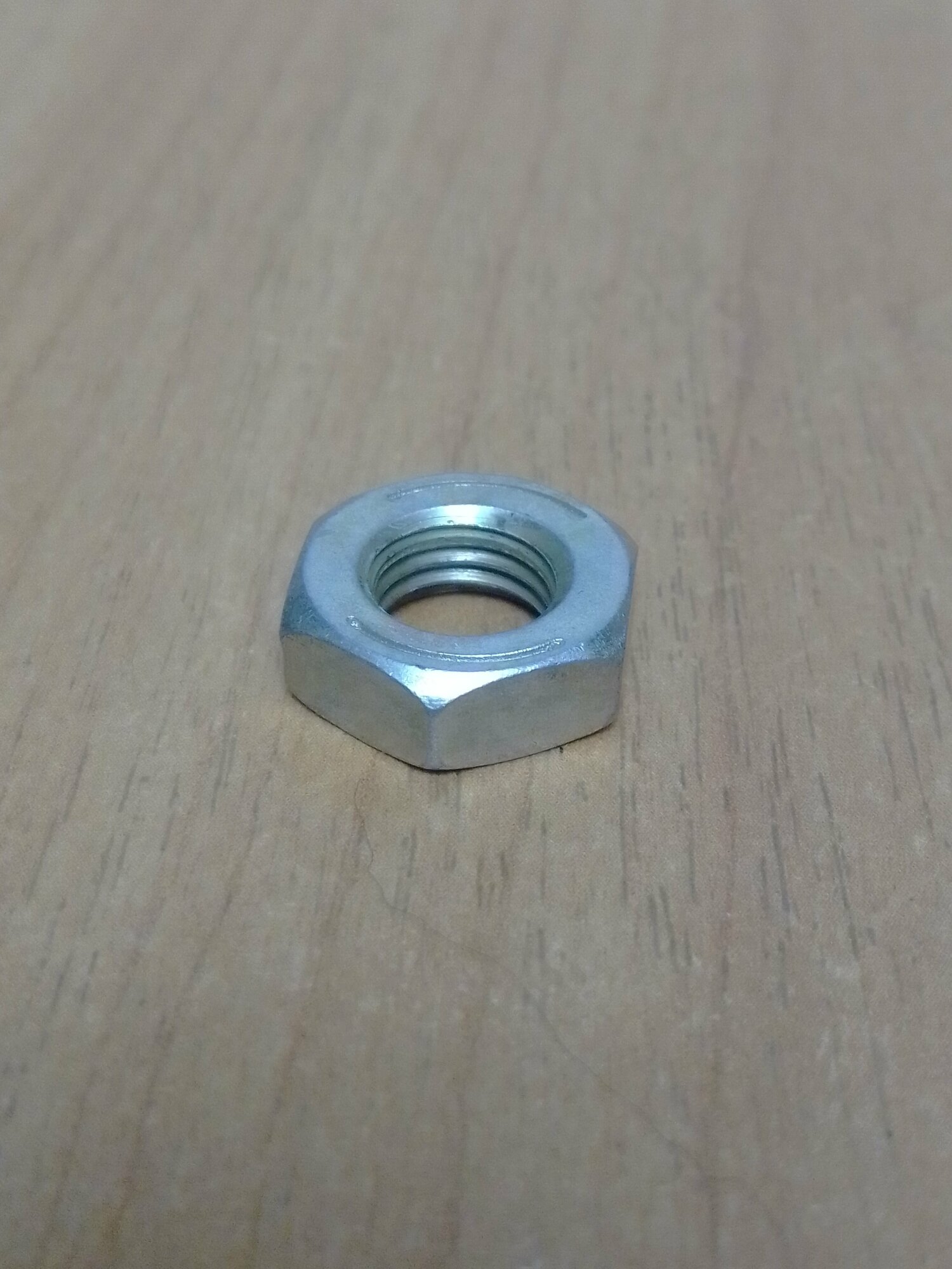 10791011. Гайка М10х1,25 низкая для автомобилей ГАЗ, ЗИЛ, МАЗ, КАМАЗ, УАЗ и др. Белзан.