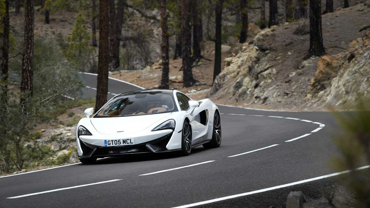 Картина на холсте 60x110 LinxOne "McLaren car road авто" интерьерная для дома / на стену / на кухню / с подрамником