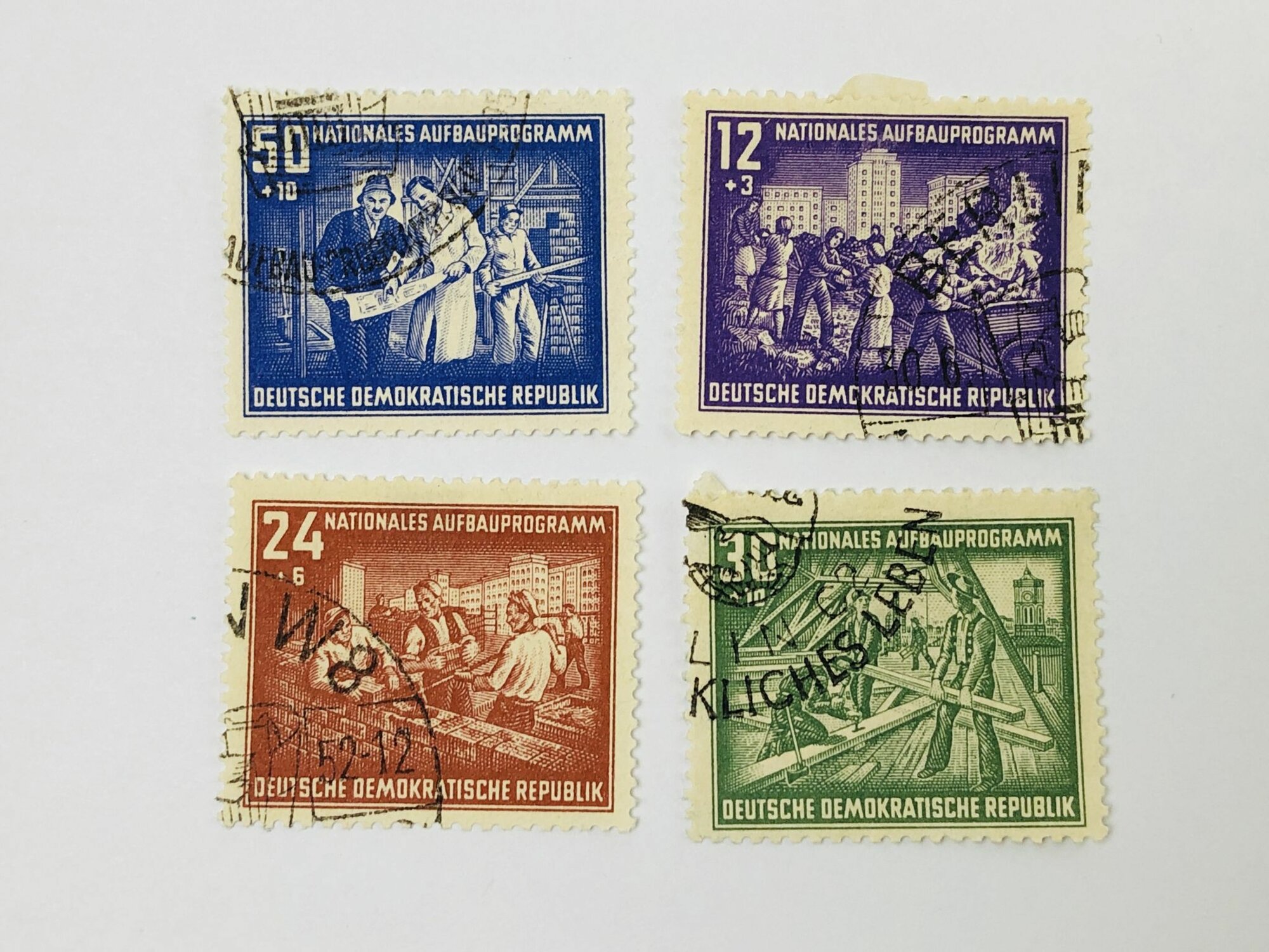 Почтовые марки Программа развития Берлина. Совок. Здание. Крыша. Планирование строительства. Полная серия. Наука. Германия (ГДР). 1952. Михель: DD 303-306. Гашен