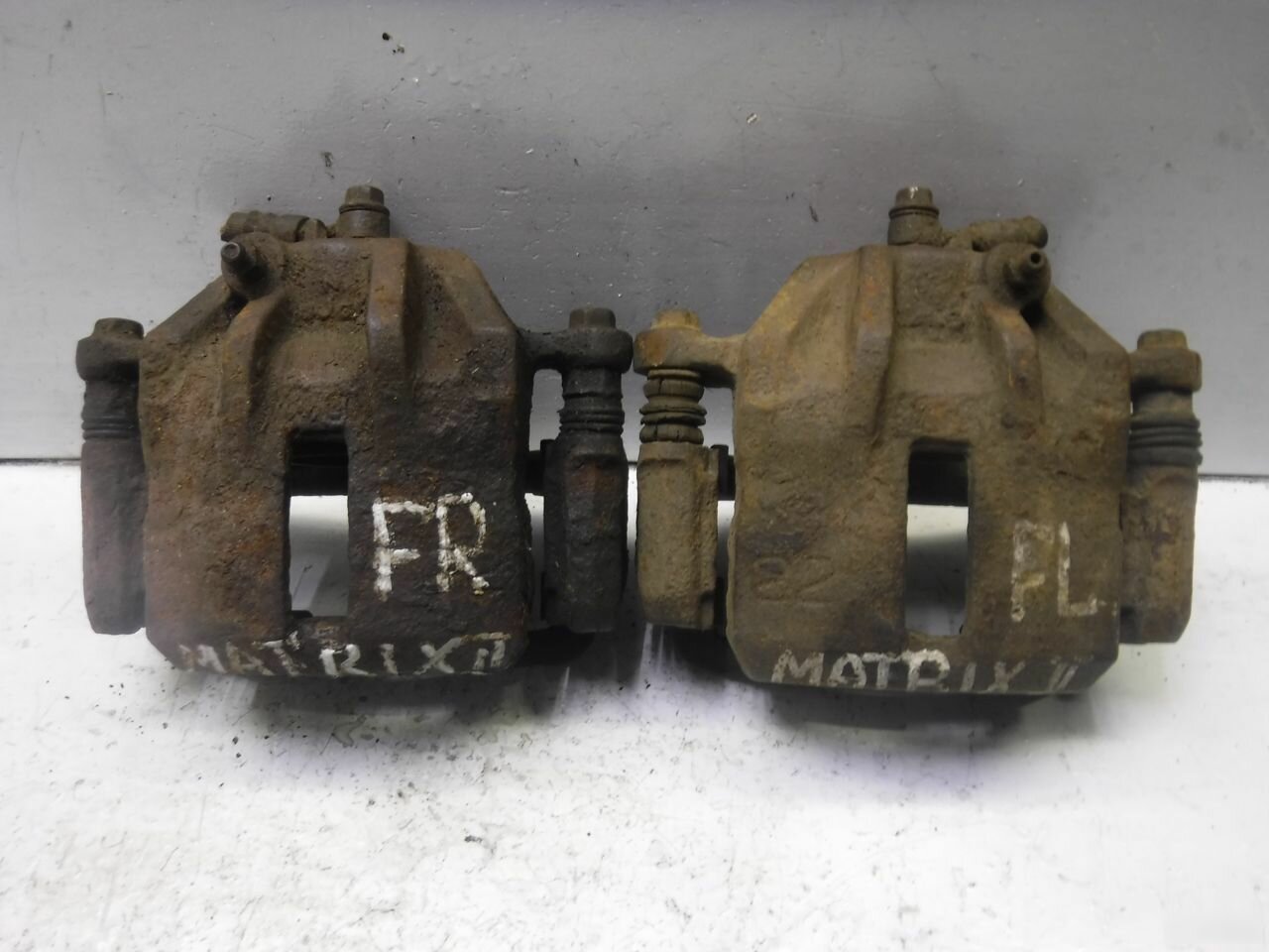 Суппорт тормозной передний Hyundai Matrix I (2001—2005) 581802DA20
