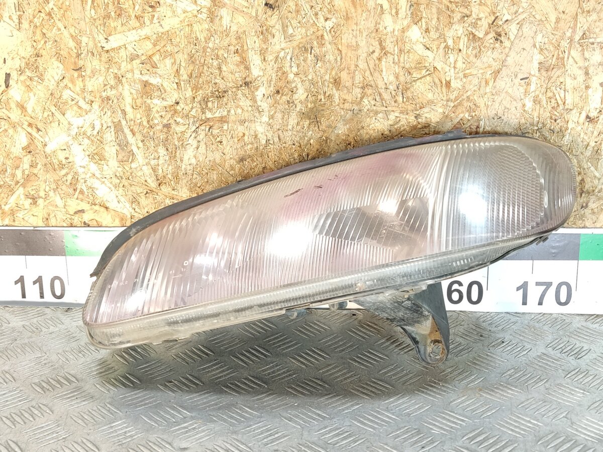 Фара левая OPEL Omega B 90457761