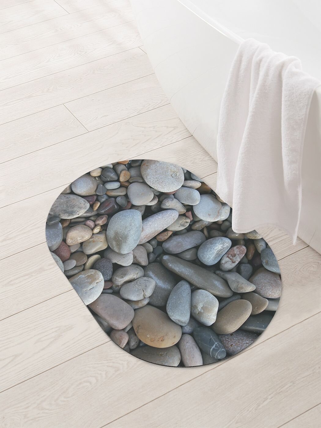 Коврик для ванной и туалета овальный противоскользящий JoyArty "Морская галька" 58x38 см
