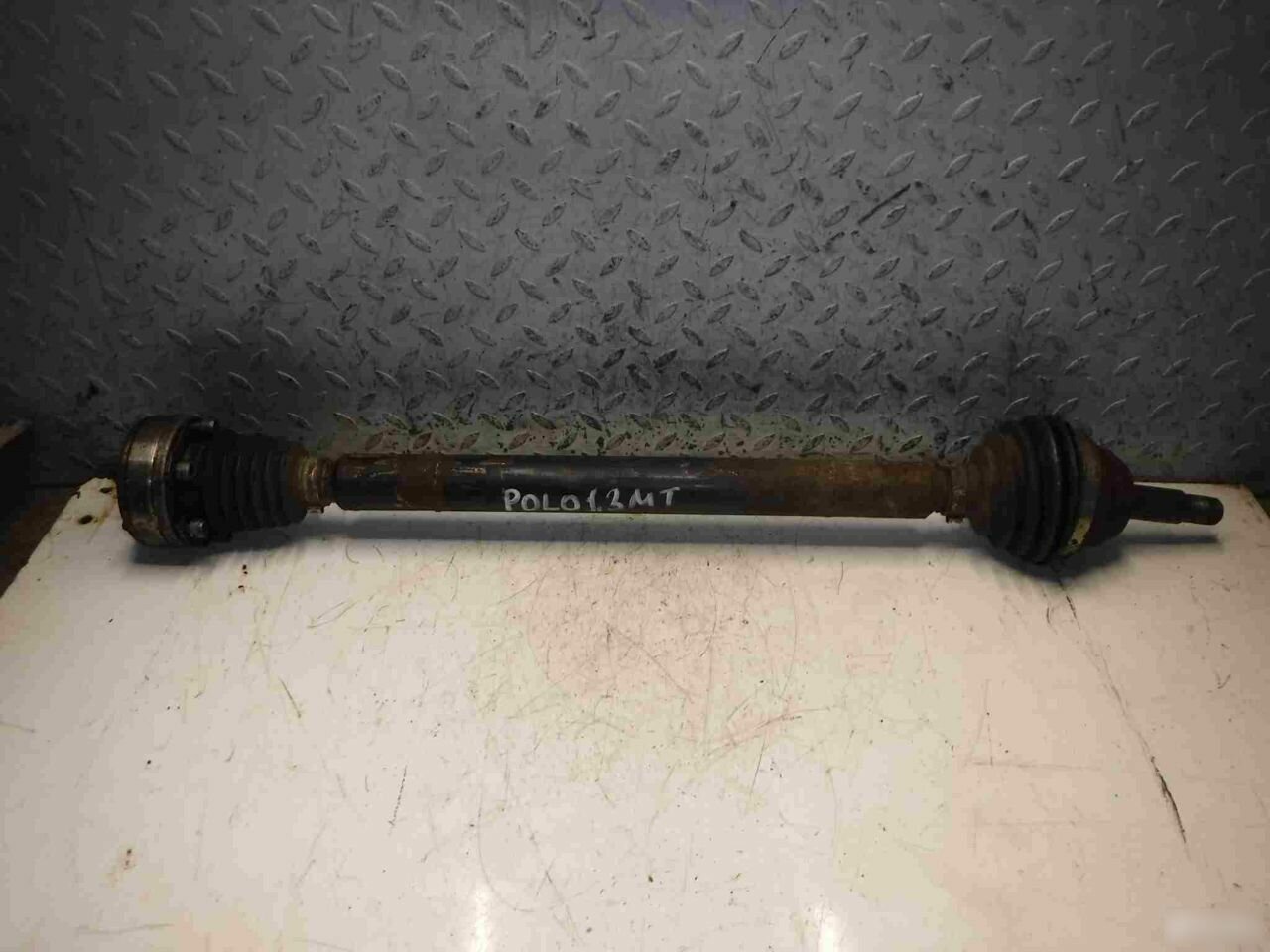 Полуось передняя правая Volkswagen Polo III (1994—2002) JZW407450FX