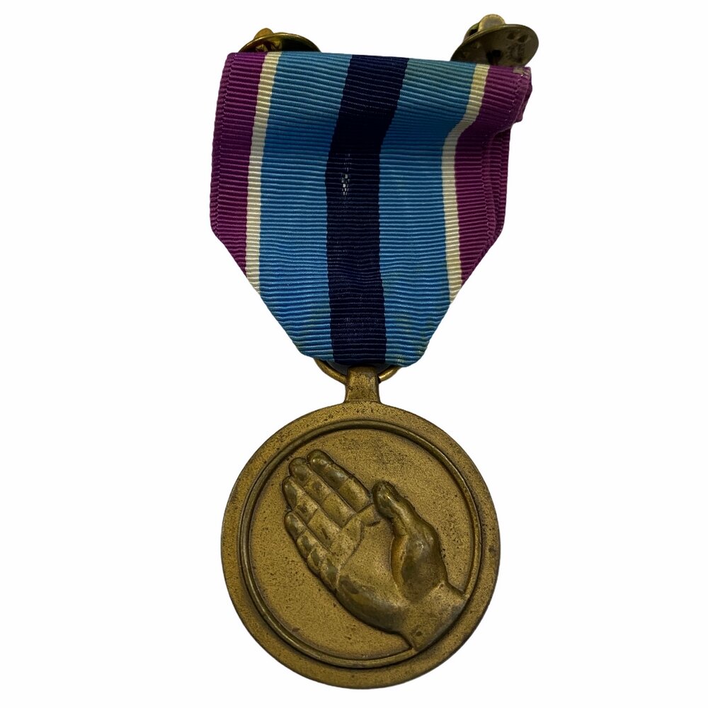 США, медаль "За участие в гуманитарных операциях" 1977-2000 гг.